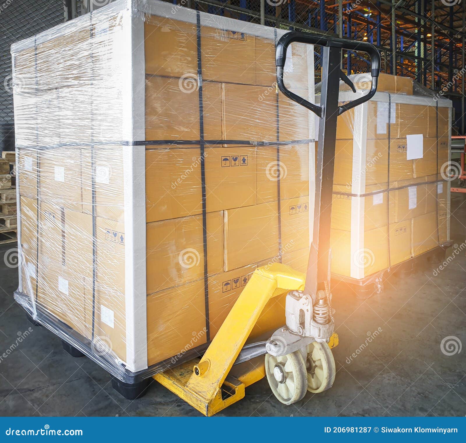 Cargo Shipment Boxes. Stacked of Cardboard Boxes on Pallet Rack at the ...