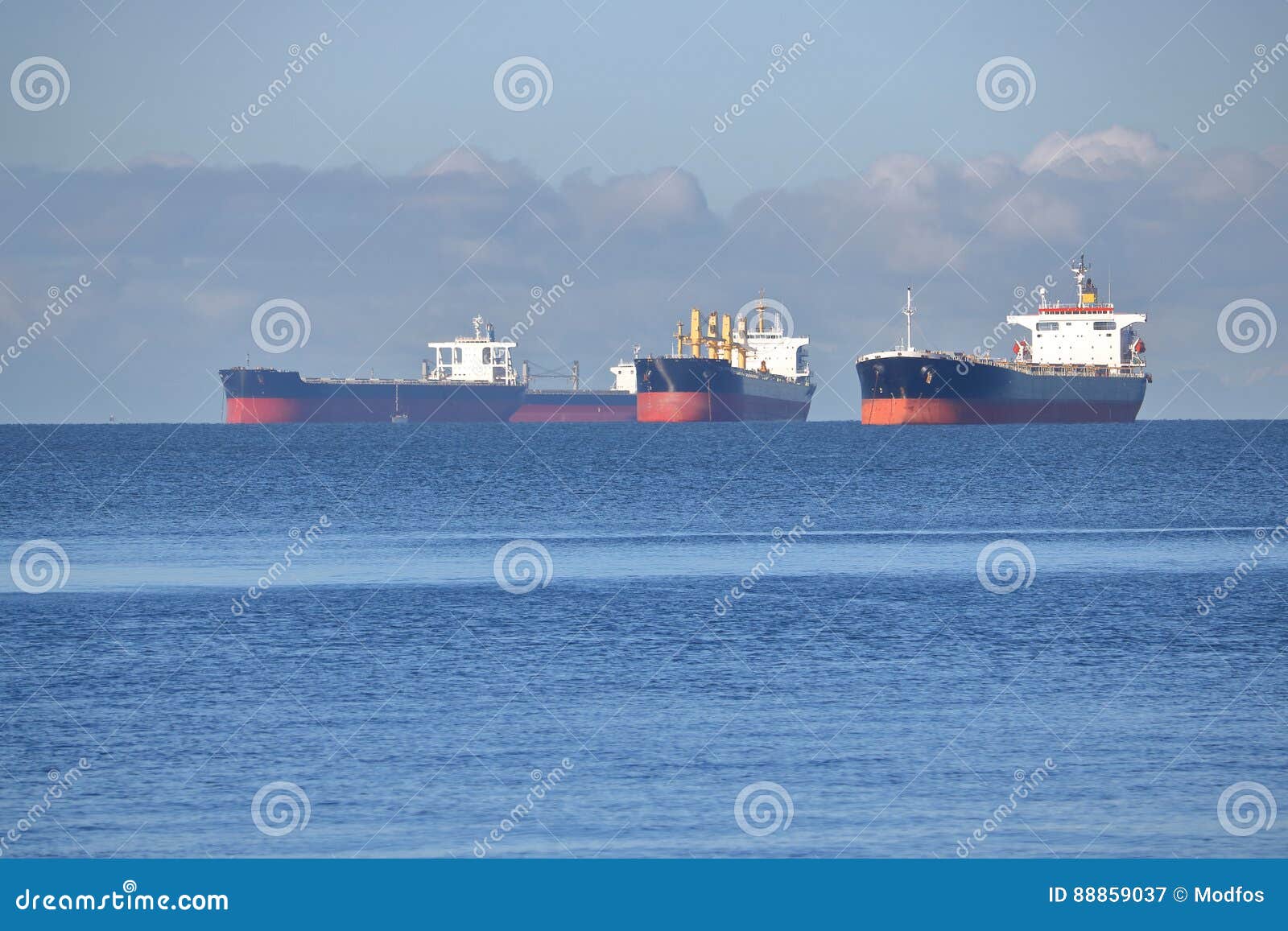 Cargo Shipping Freighters Anchored in Ocean Stock Image - Image of ...