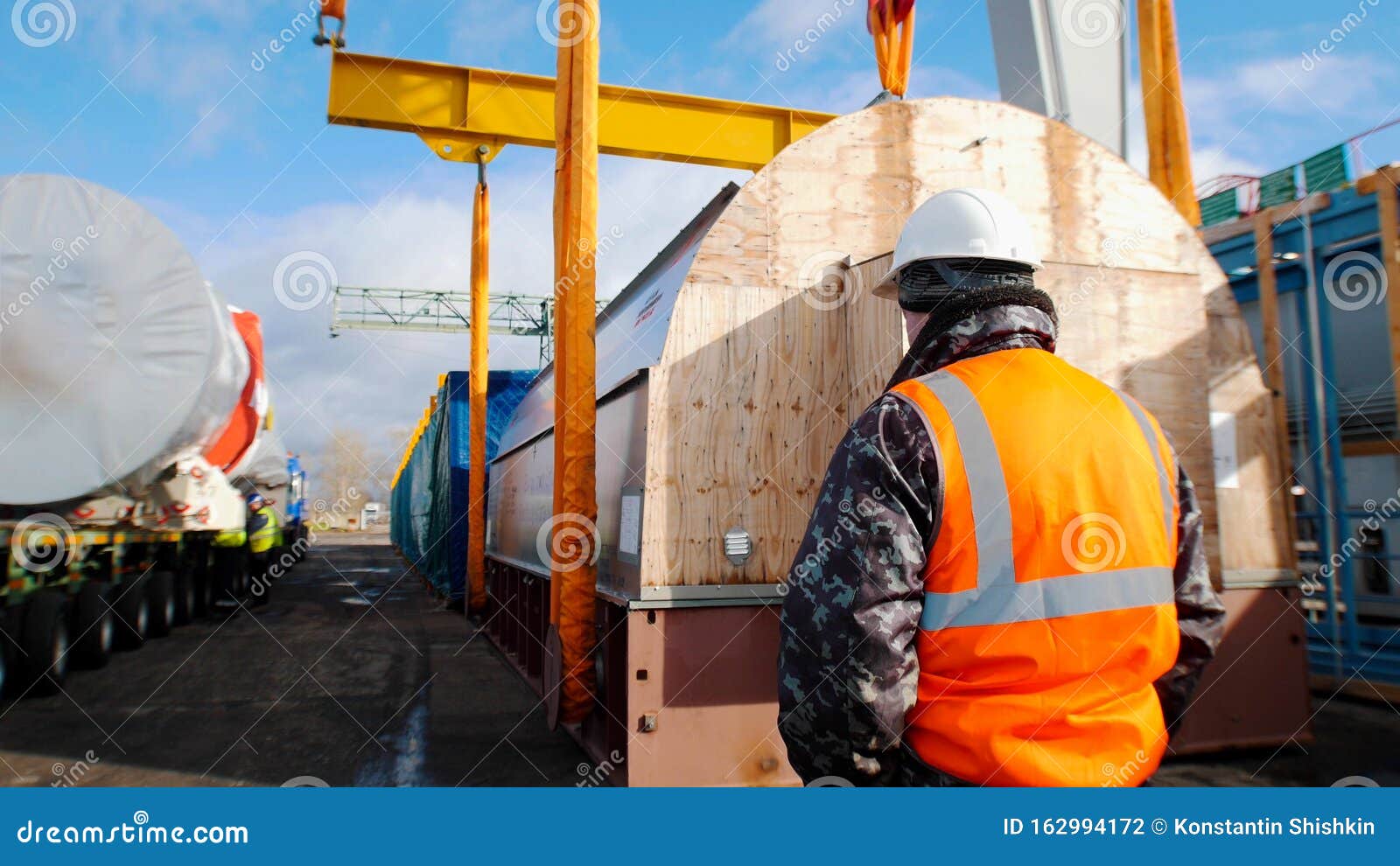 Cargo Shipping - a Man Worker Standing on the Construction Site Stock ...