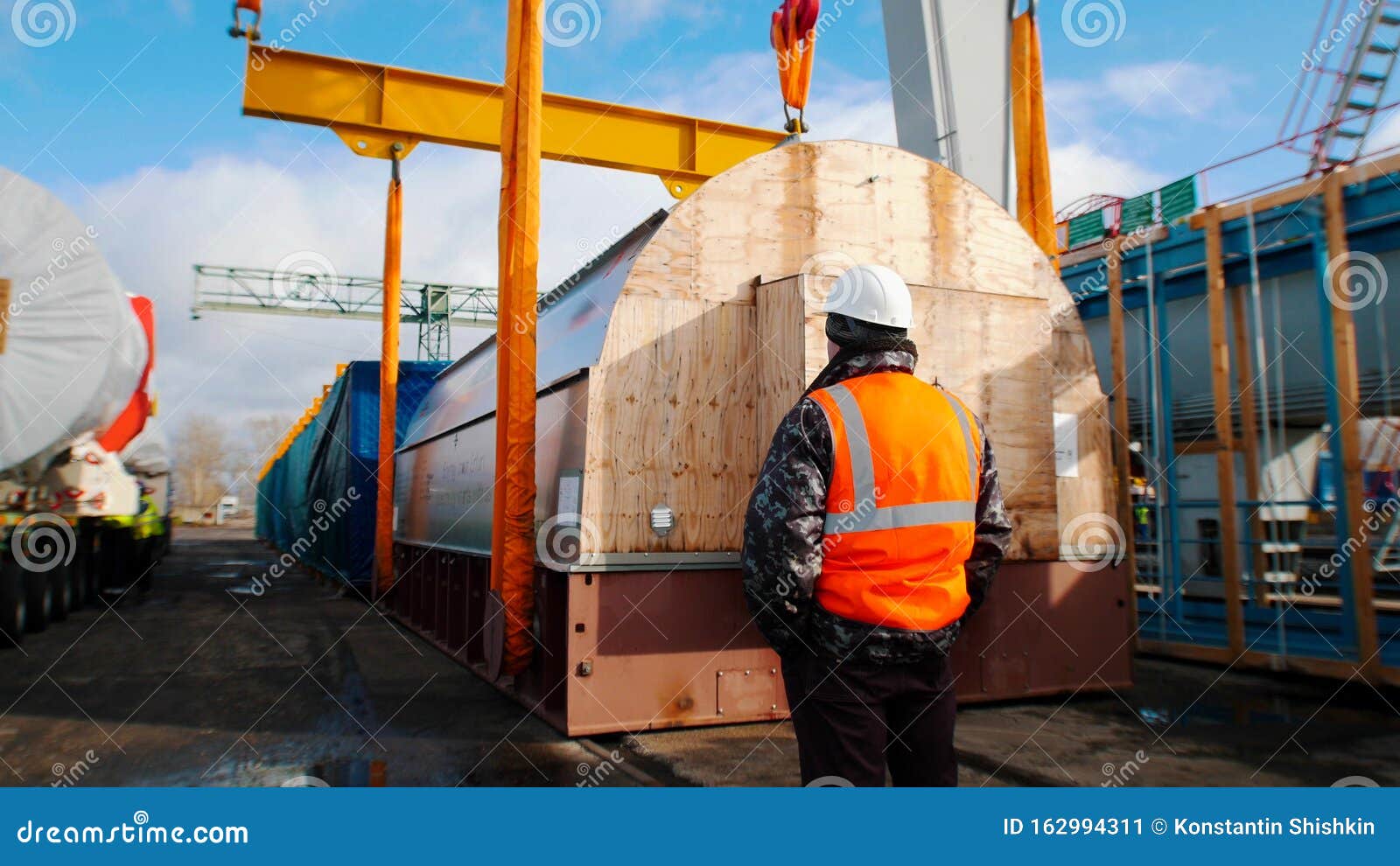 Cargo Shipping - a Man Worker Standing on the Construction Site and ...