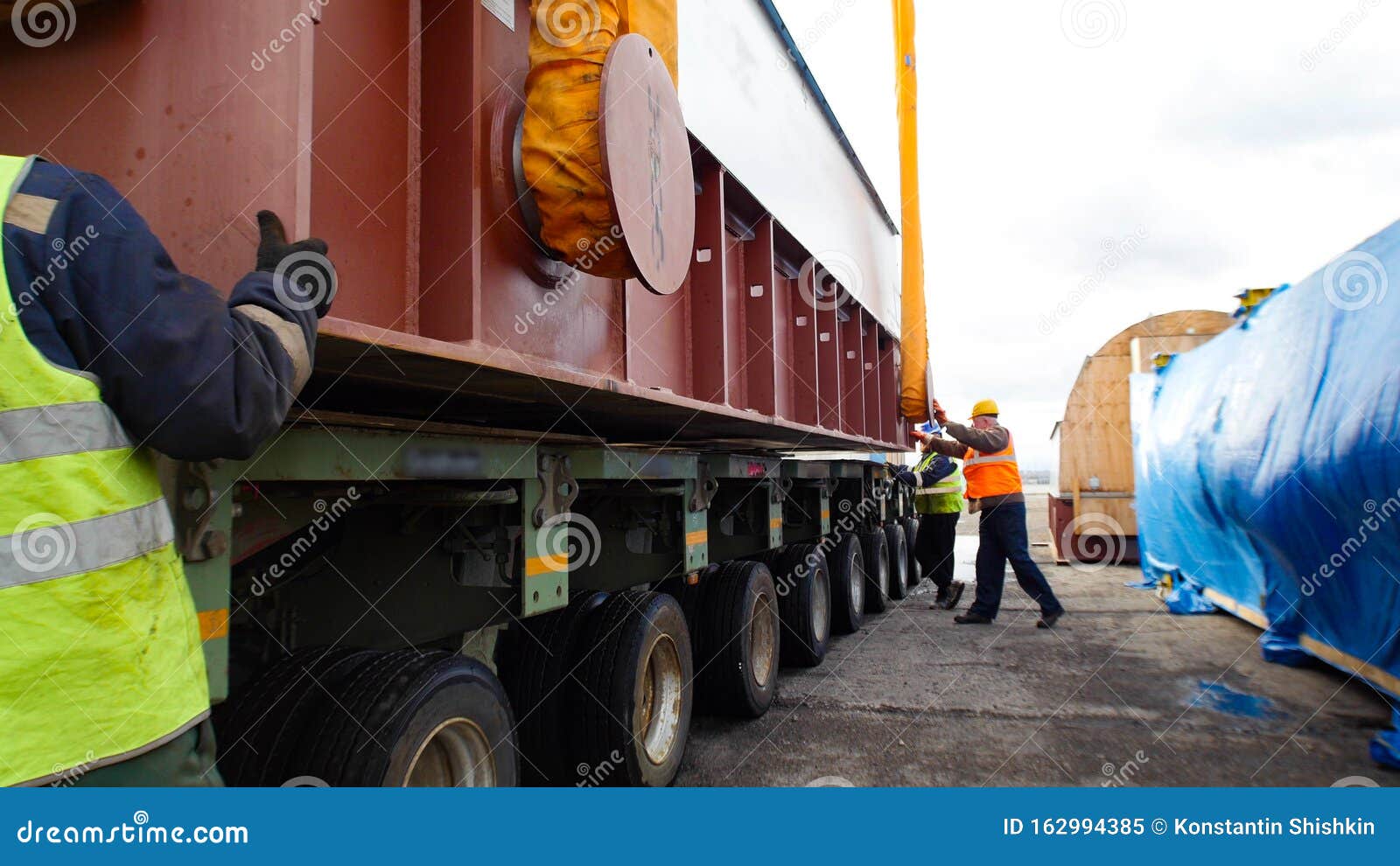 Workers In Protective Clothes Decontaminating Square Near ...