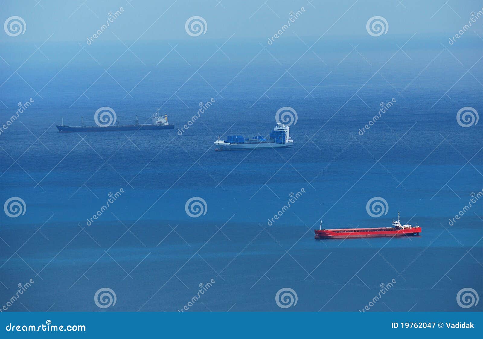 Cargo ships in blue sea stock image. Image of view, barge - 19762047
