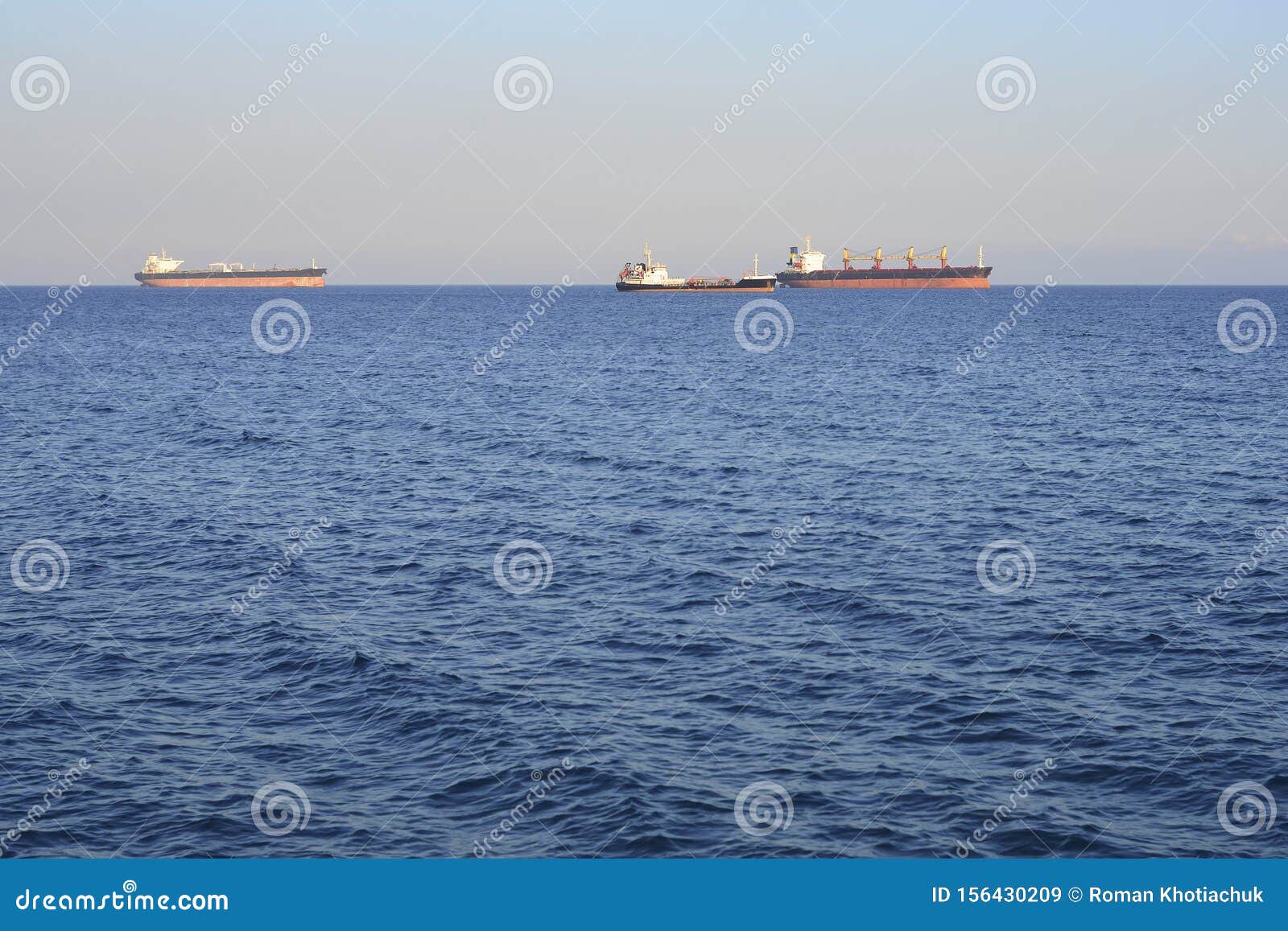 Cargo Ships on the Horizon. Stock Image - Image of industry, shipping ...