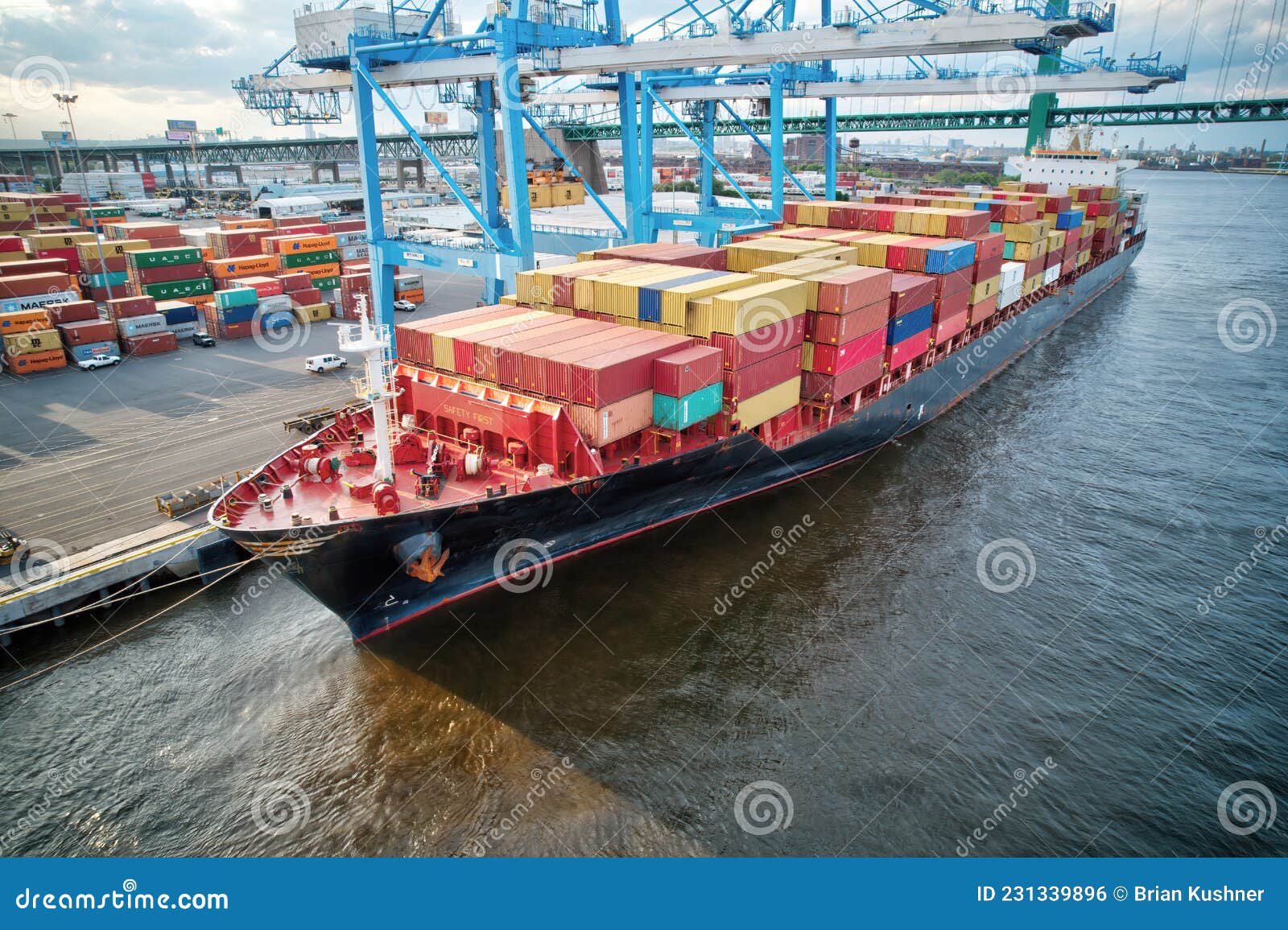 Cargo Ships Loaded with Cargo Sitting in Port Editorial Photo - Image ...