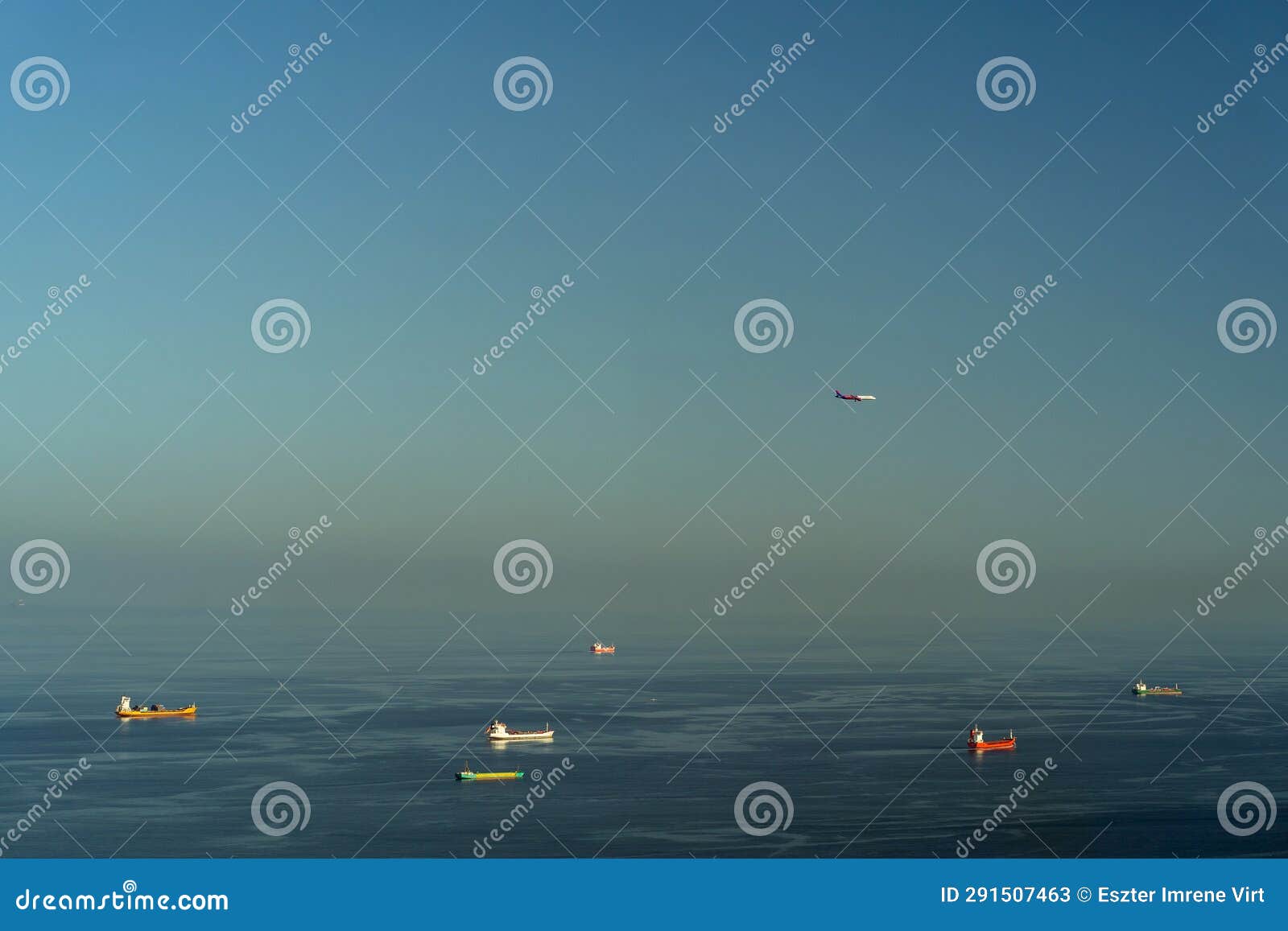 Cargo Ships and a Plane Over the Sea Stock Image - Image of cargo ...