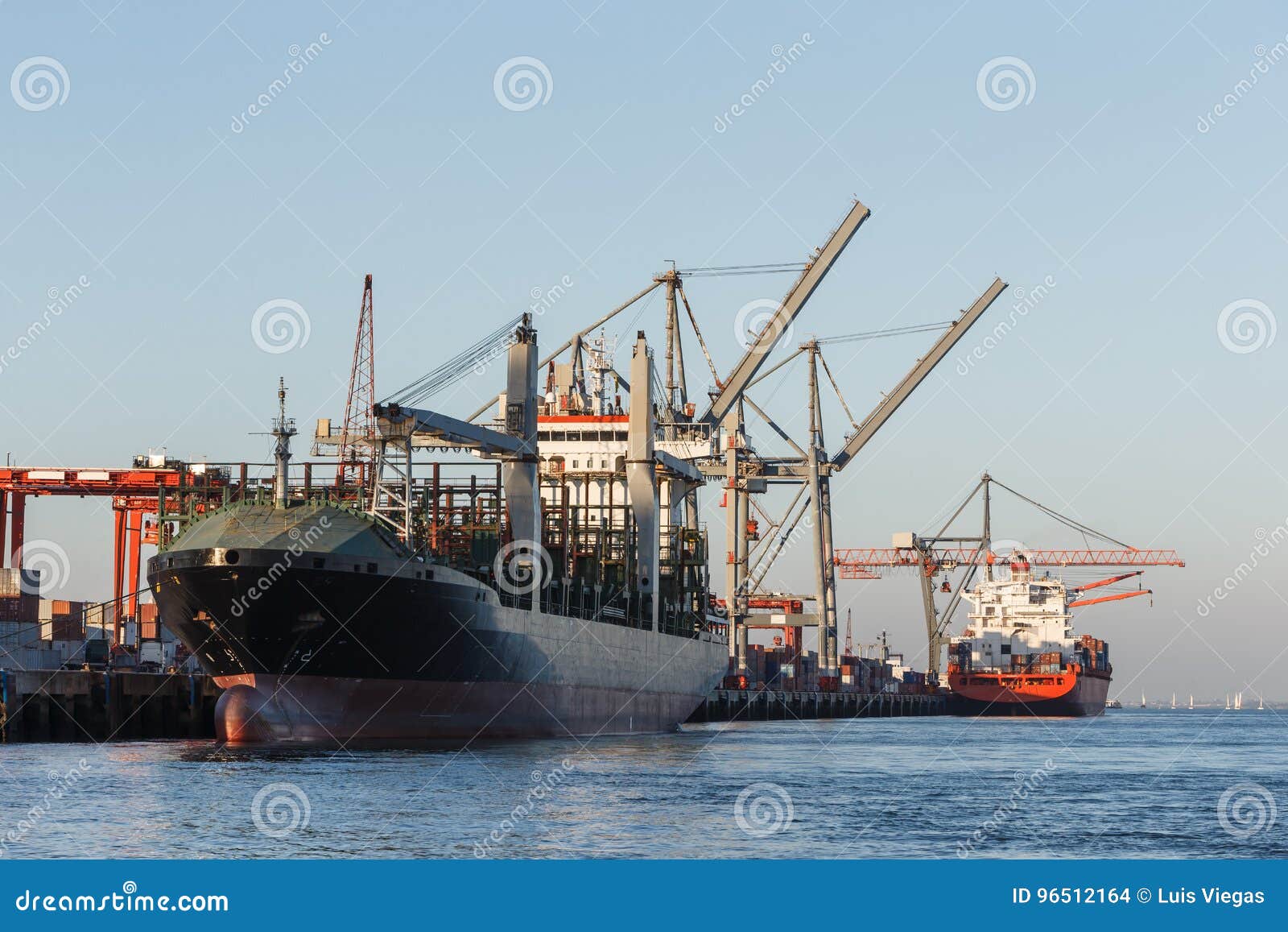Cargo Ships in Port Being Loaded Stock Photo - Image of maritime ...