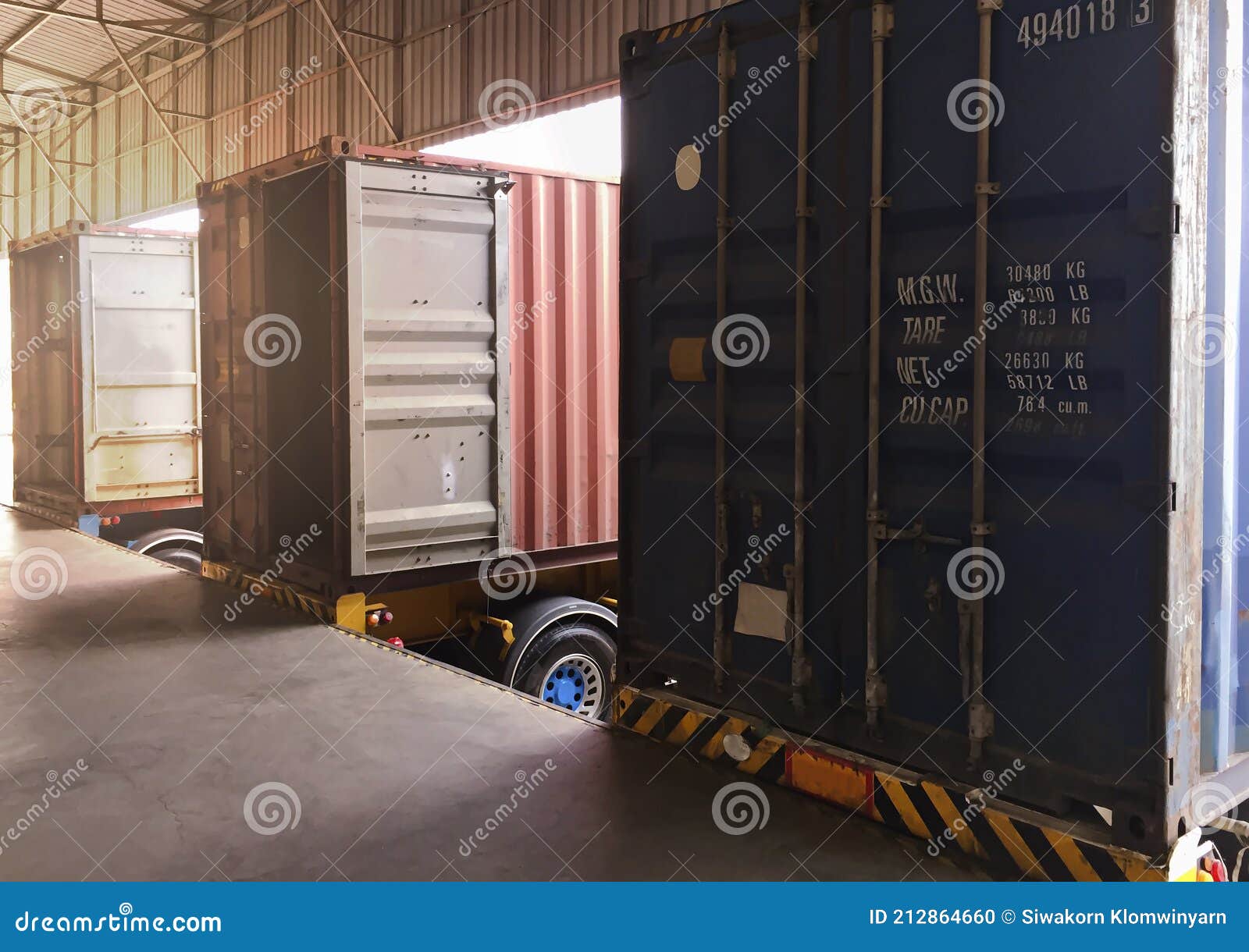 Cargo Trailer Truck Parked Loading at Dock Warehouse. Cargo Shipment ...