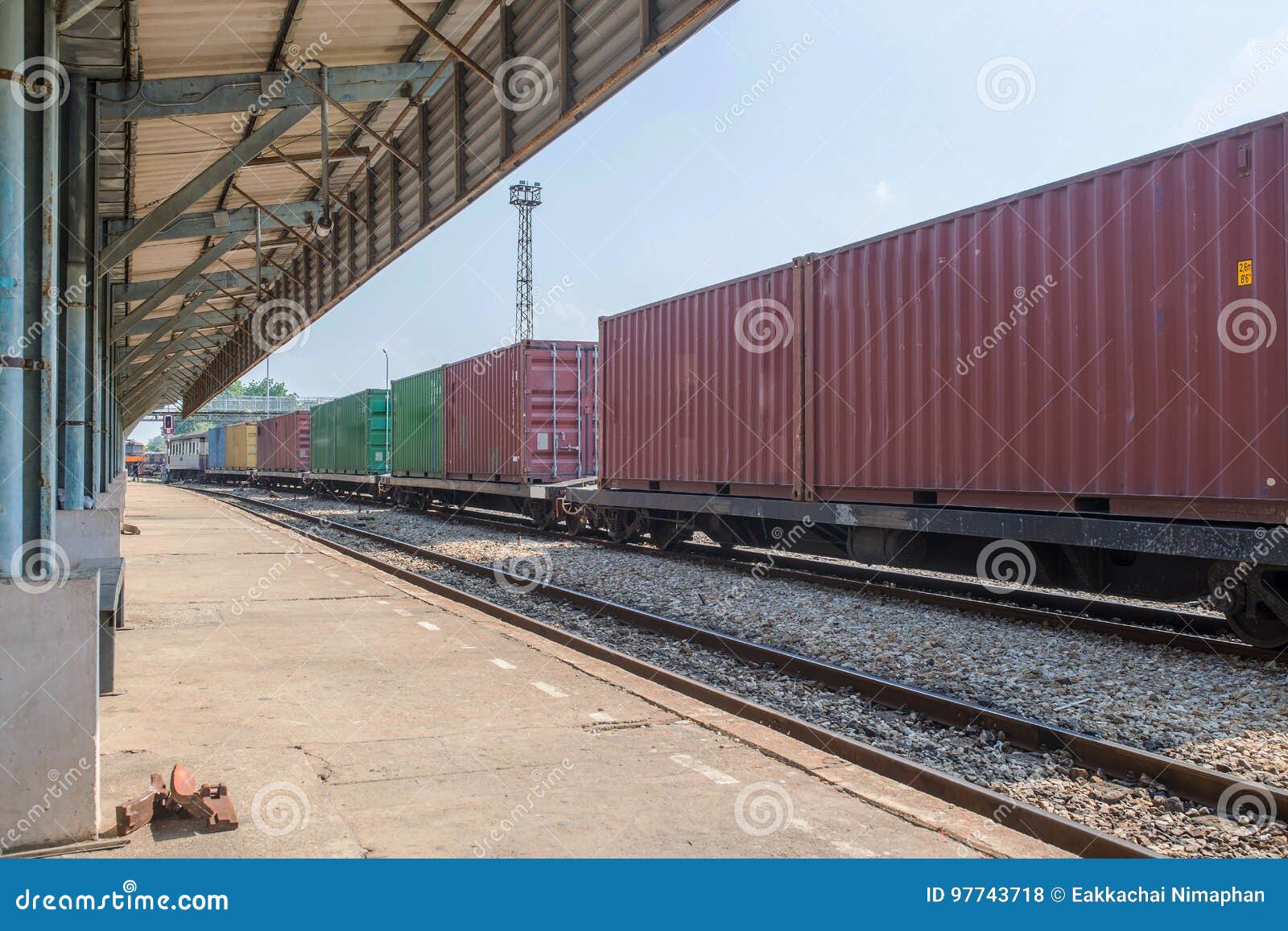 Cargo train in station stock photo. Image of boxcar, springs - 97743718