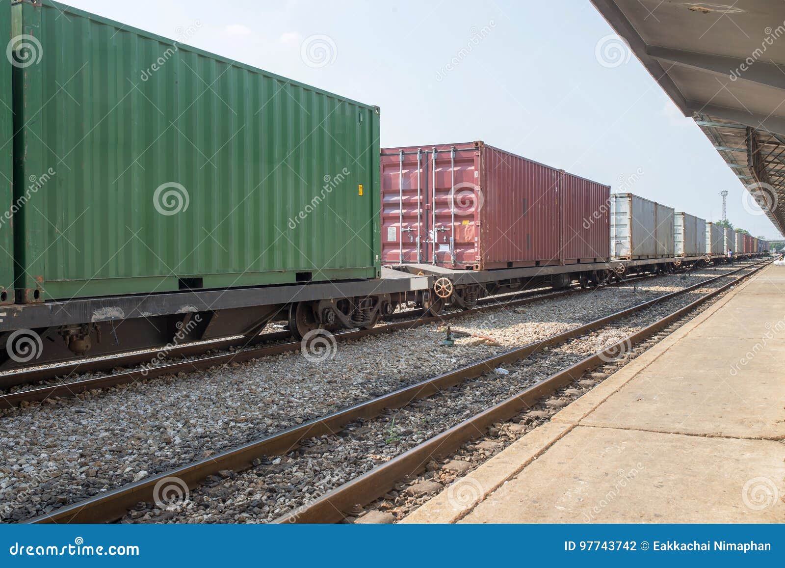 Cargo train in station stock photo. Image of chassis - 97743742