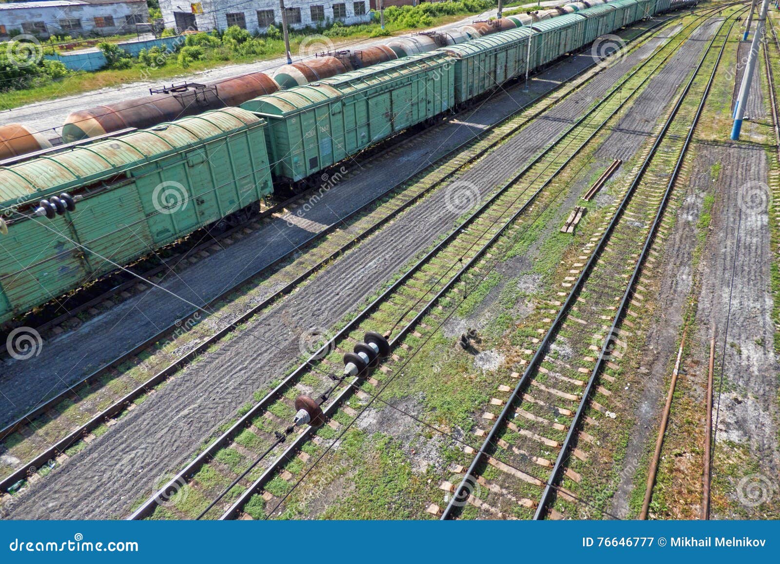 Cargo Trains and Empty Rails at Station Stock Image - Image of shipment ...