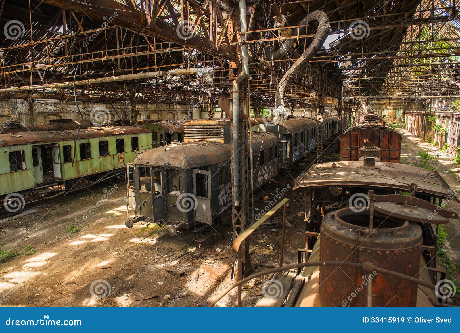 Cargo Trains in Old Train Depot Stock Image - Image of desolate ...