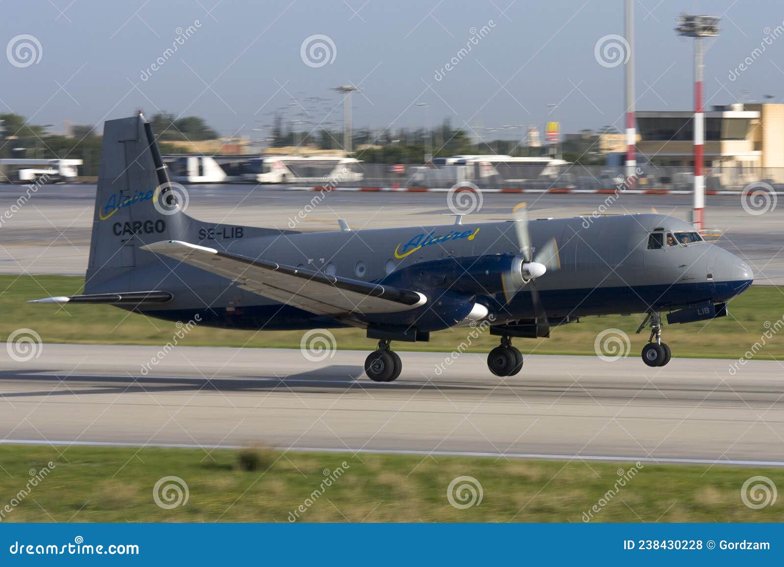 Cargo turboprop taking off editorial stock photo. Image of prop - 238430228