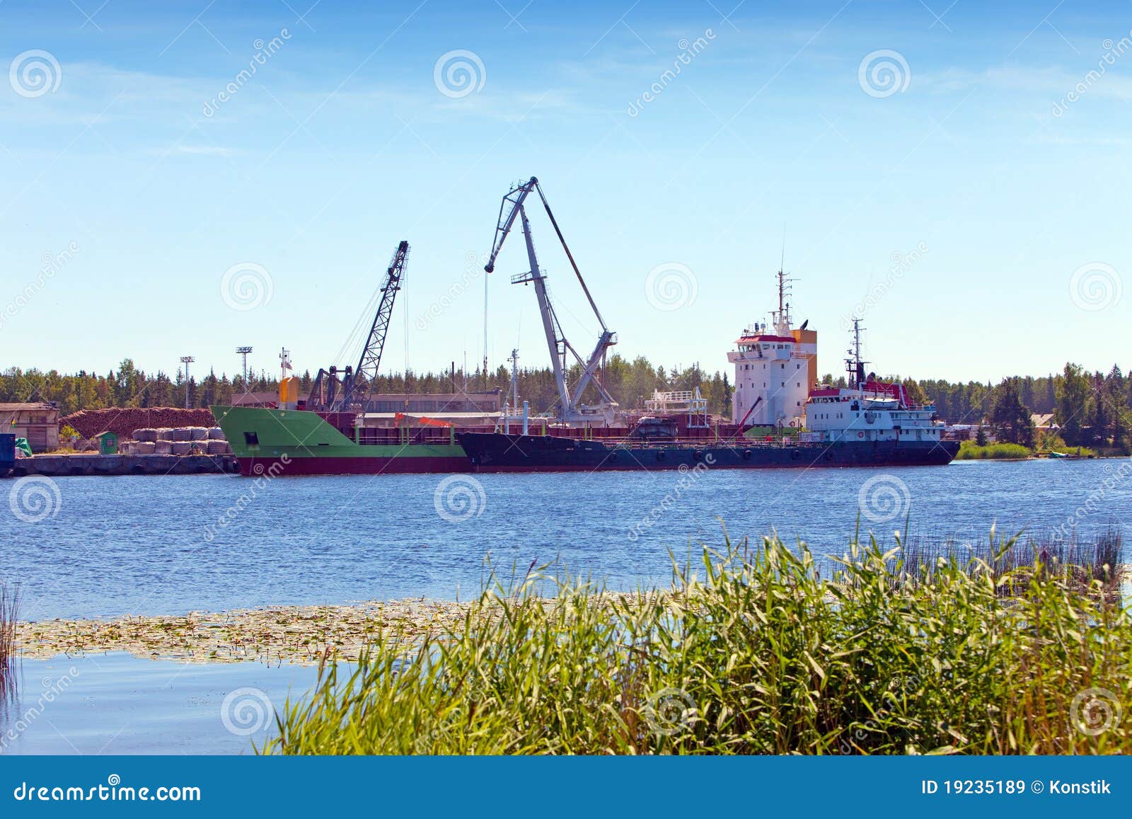 Cargoship Unloading on the River Luga. Russia Stock Image - Image of ...