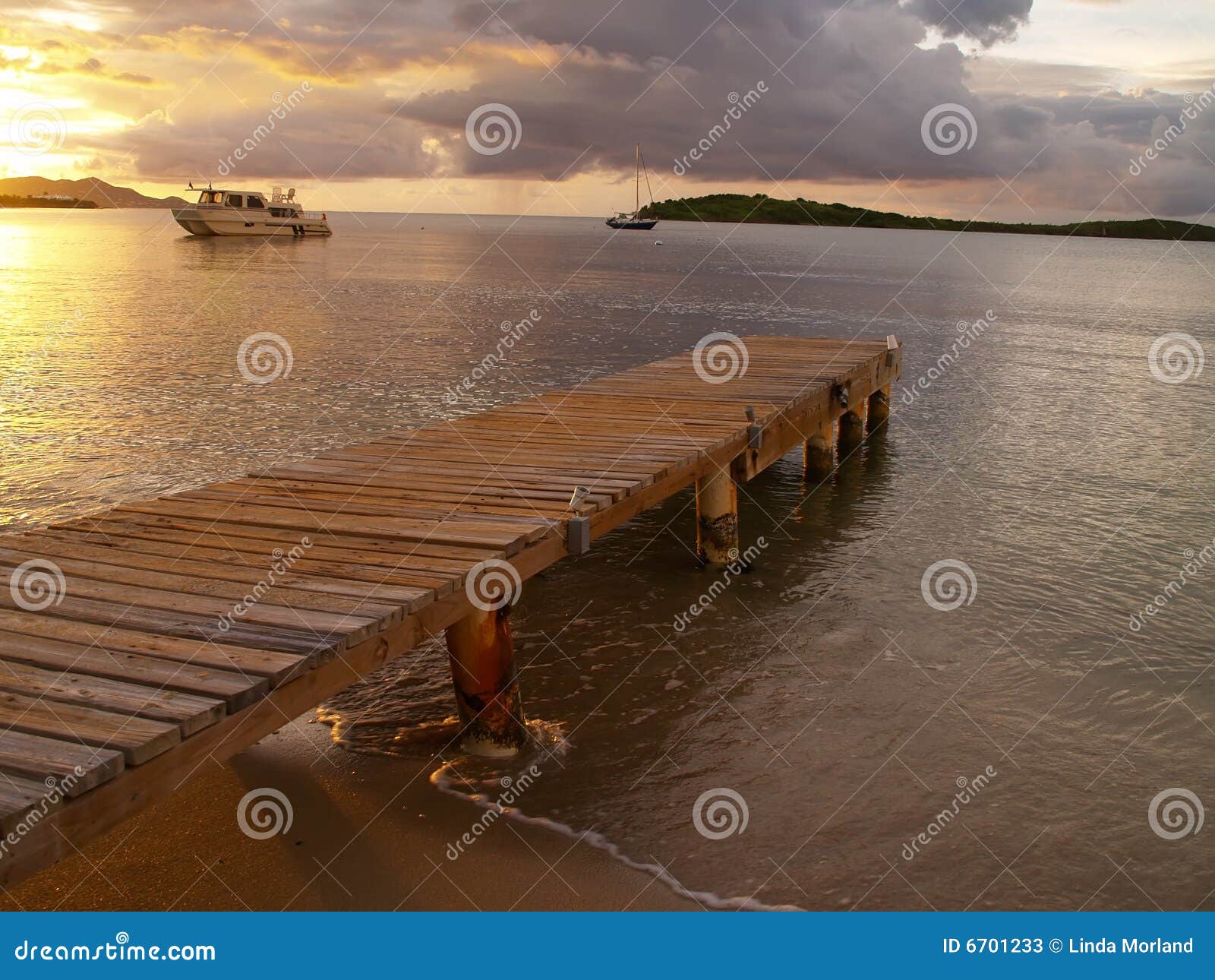 Caribbean dock at sunset stock image. Image of ripple - 6701233