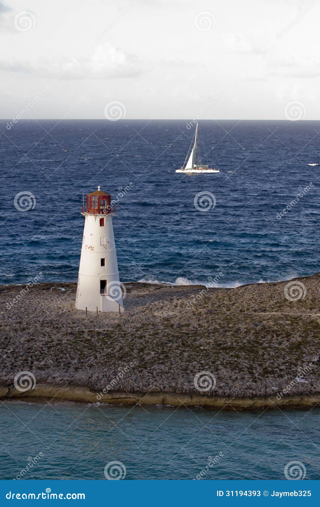 Caribbean Lighthouse stock image. Image of boat, sail - 31194393