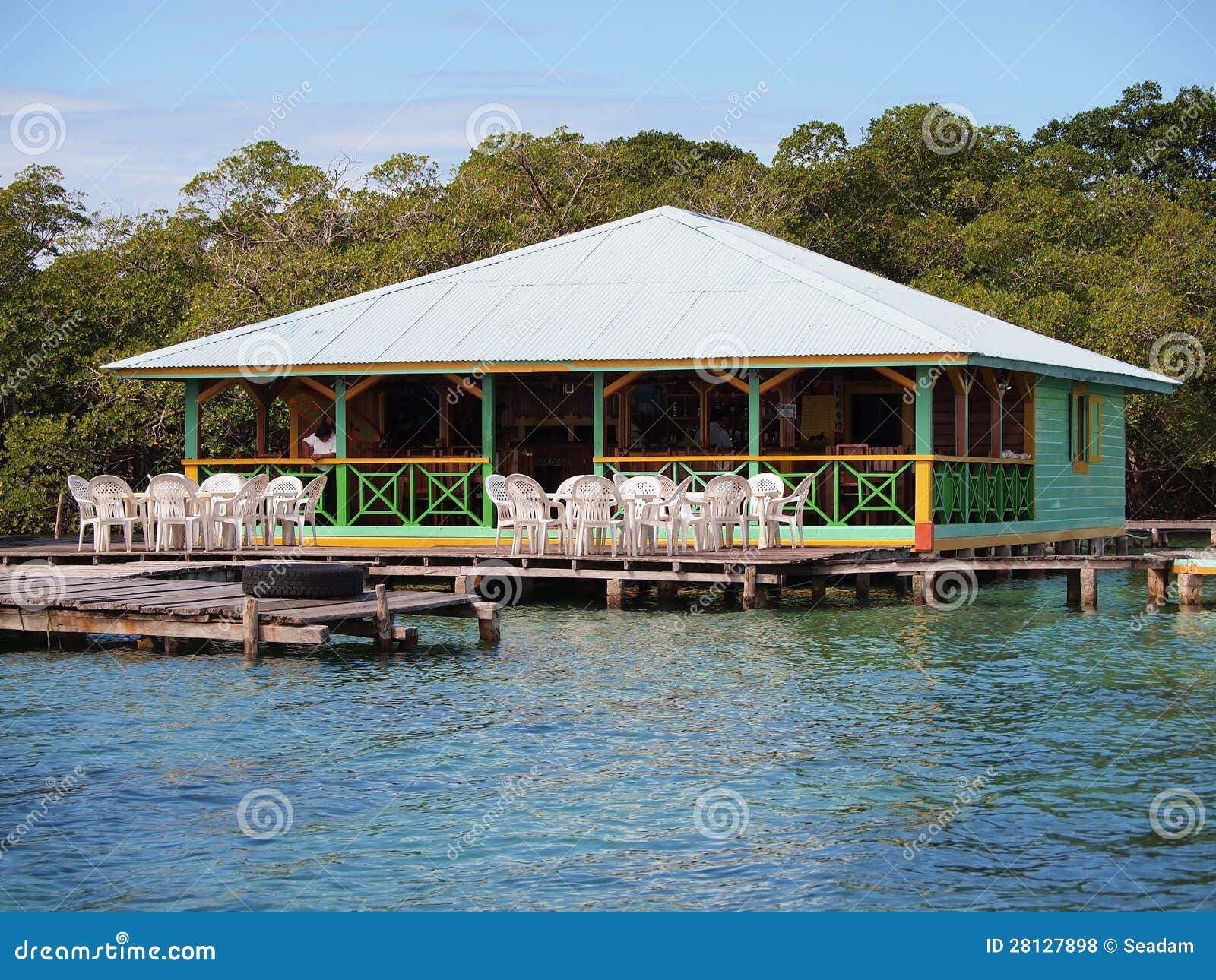 Caribbean Restaurant Over the Sea Stock Photo - Image of caribbean ...