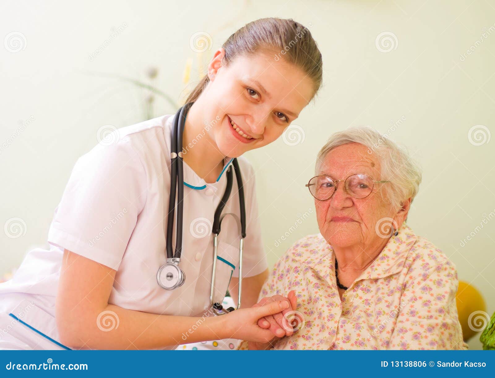 Caring Doctor with Elderly Woman Stock Photo - Image of coat, medical ...