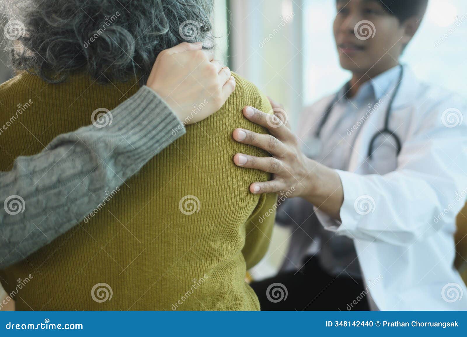 Caring Doctor Touching Shoulder of Elderly Patient Expressing Empathy ...
