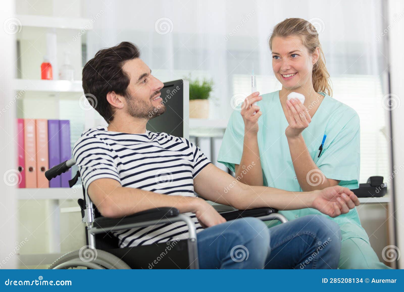 Caring Female Nurse Talking To Disabled Patient Stock Photo - Image of ...