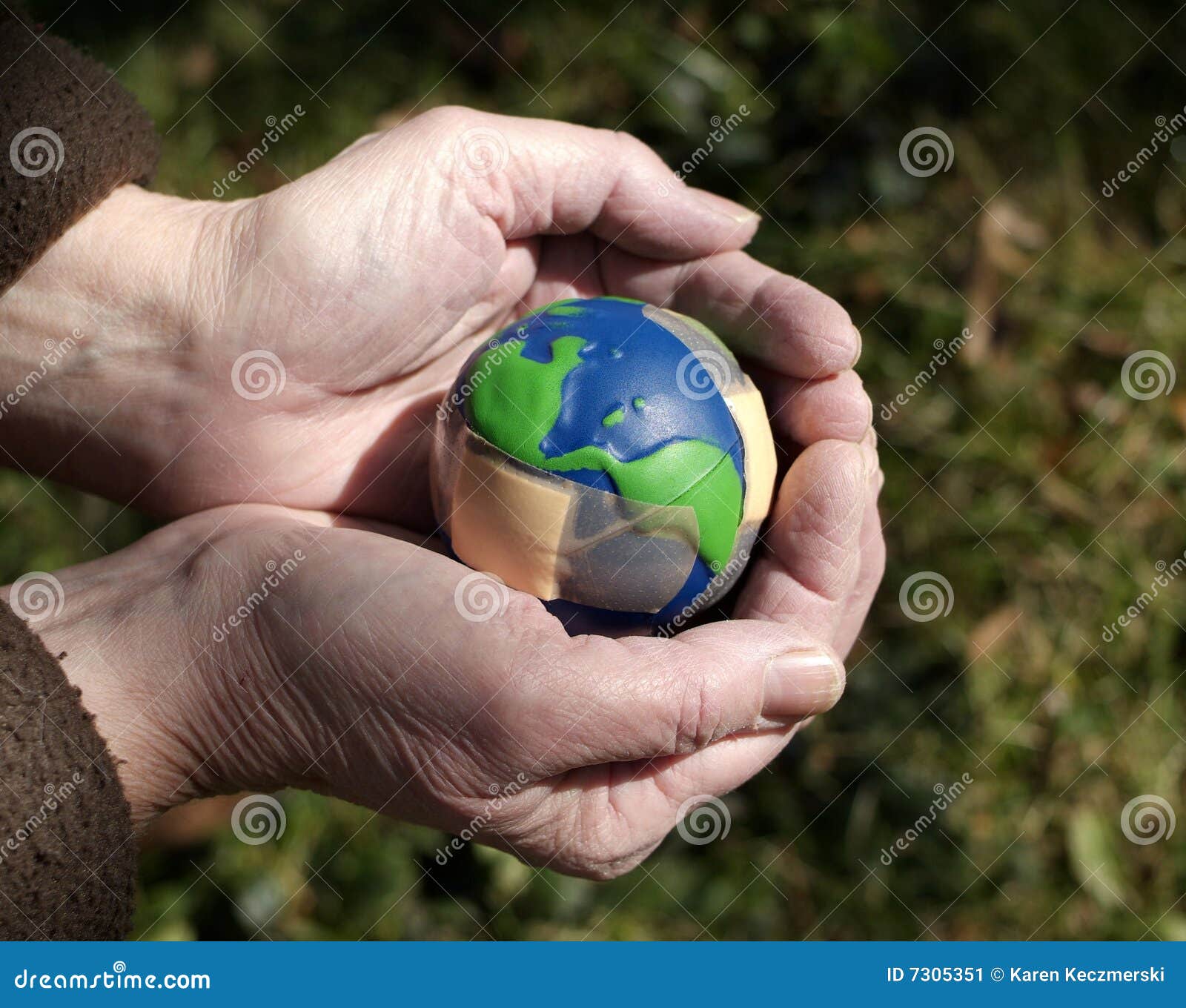 Caring for an Injured Earth Stock Image - Image of hand, human: 7305351