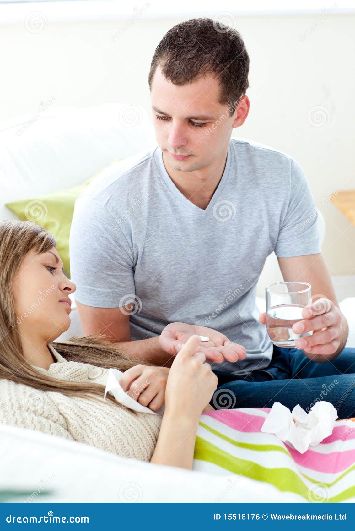 Caring Man Giving Sick Girlfriend Pills and Water Stock Photo - Image ...