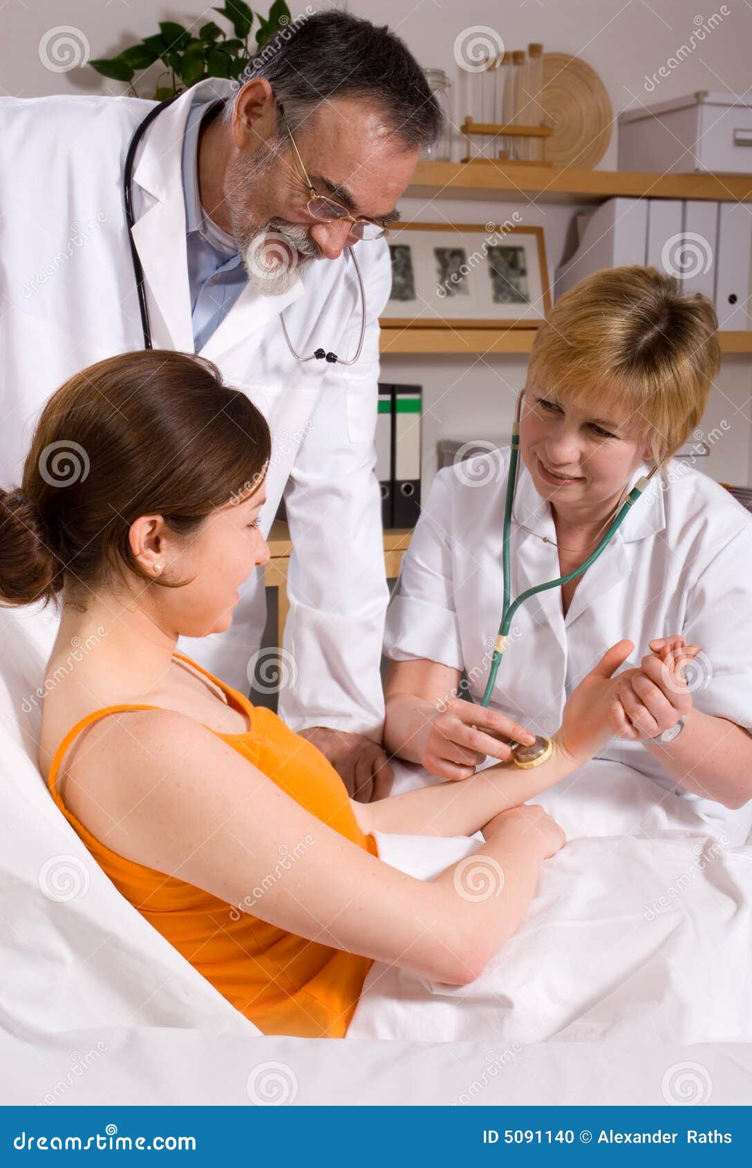 Caring professionals stock photo. Image of medical, exam - 5091140