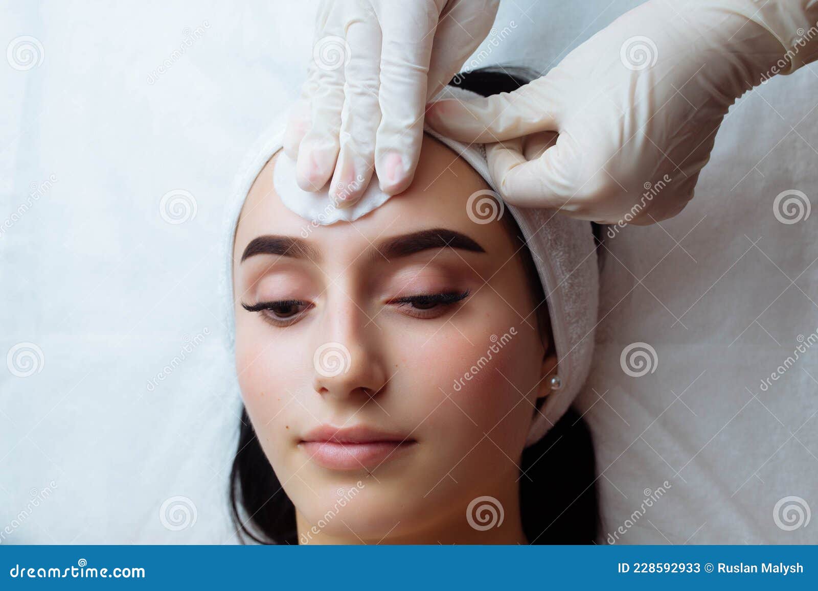 Caring For The Skin Cosmetic Cream On A Womanand X27 S Face Stock Image