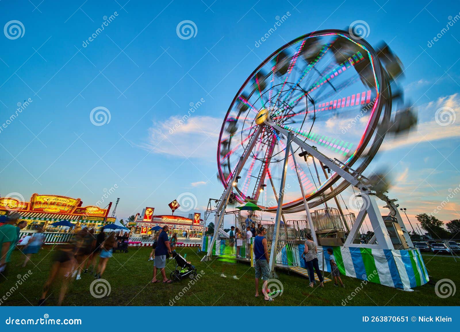Carnival County Fair with Ferris Wheel Attraction at Dusk Editorial ...