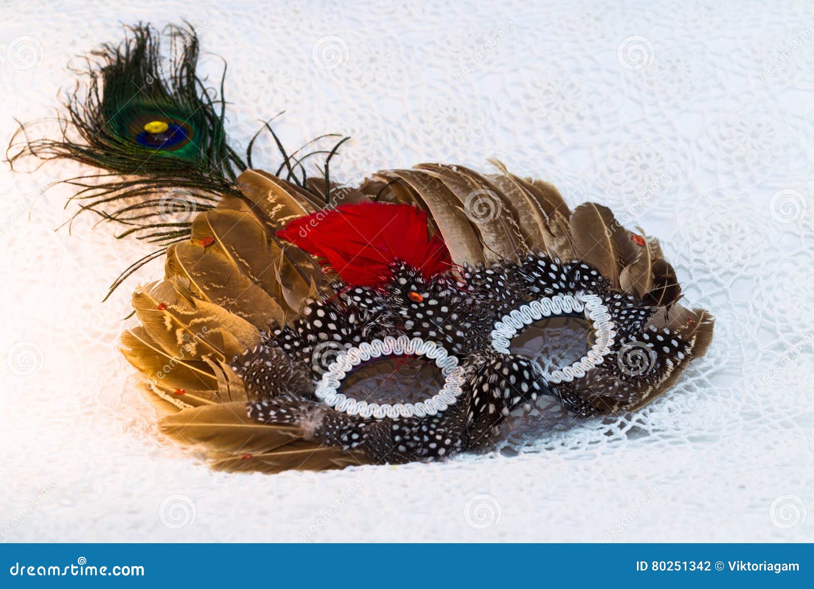 Carnival Mask with Feathers on a White Lace Background Stock Photo ...