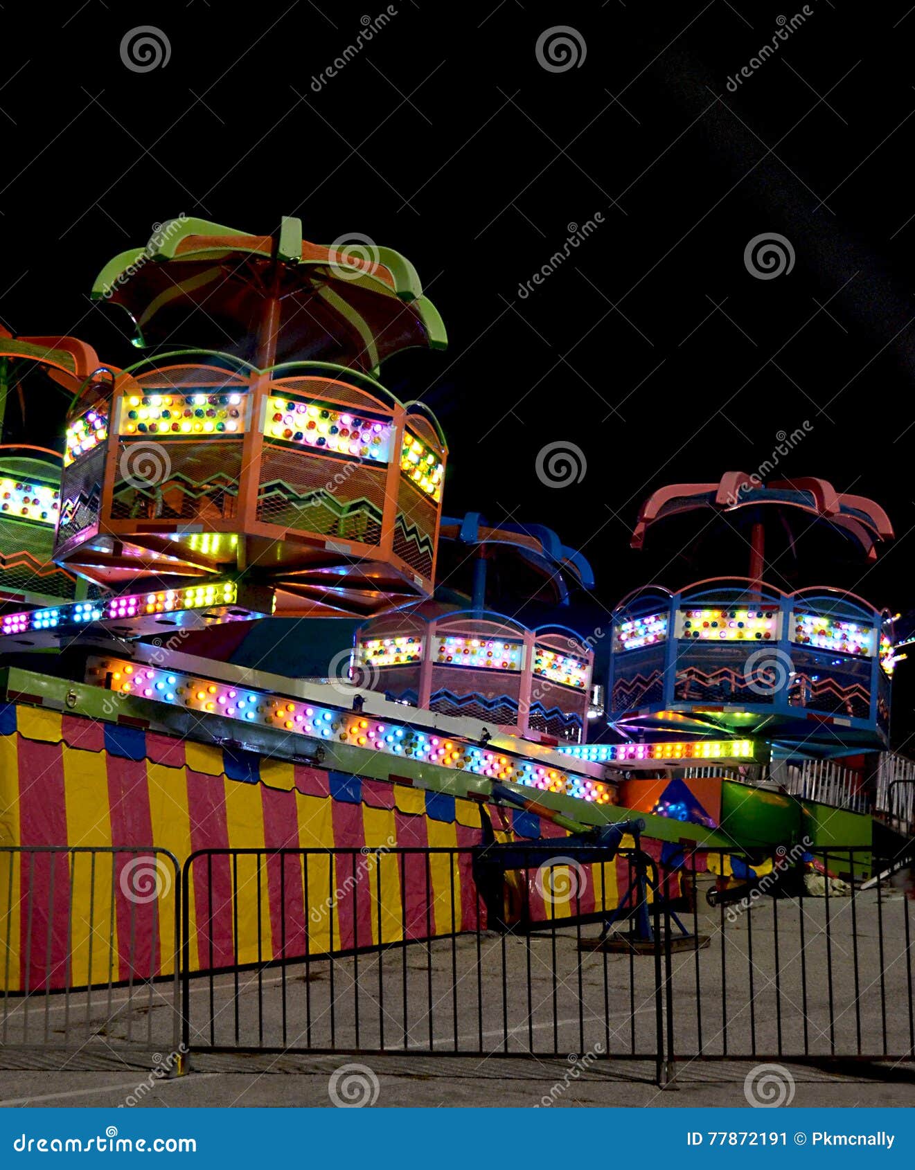 Carnival Ride at Night stock image. Image of amusement - 77872191