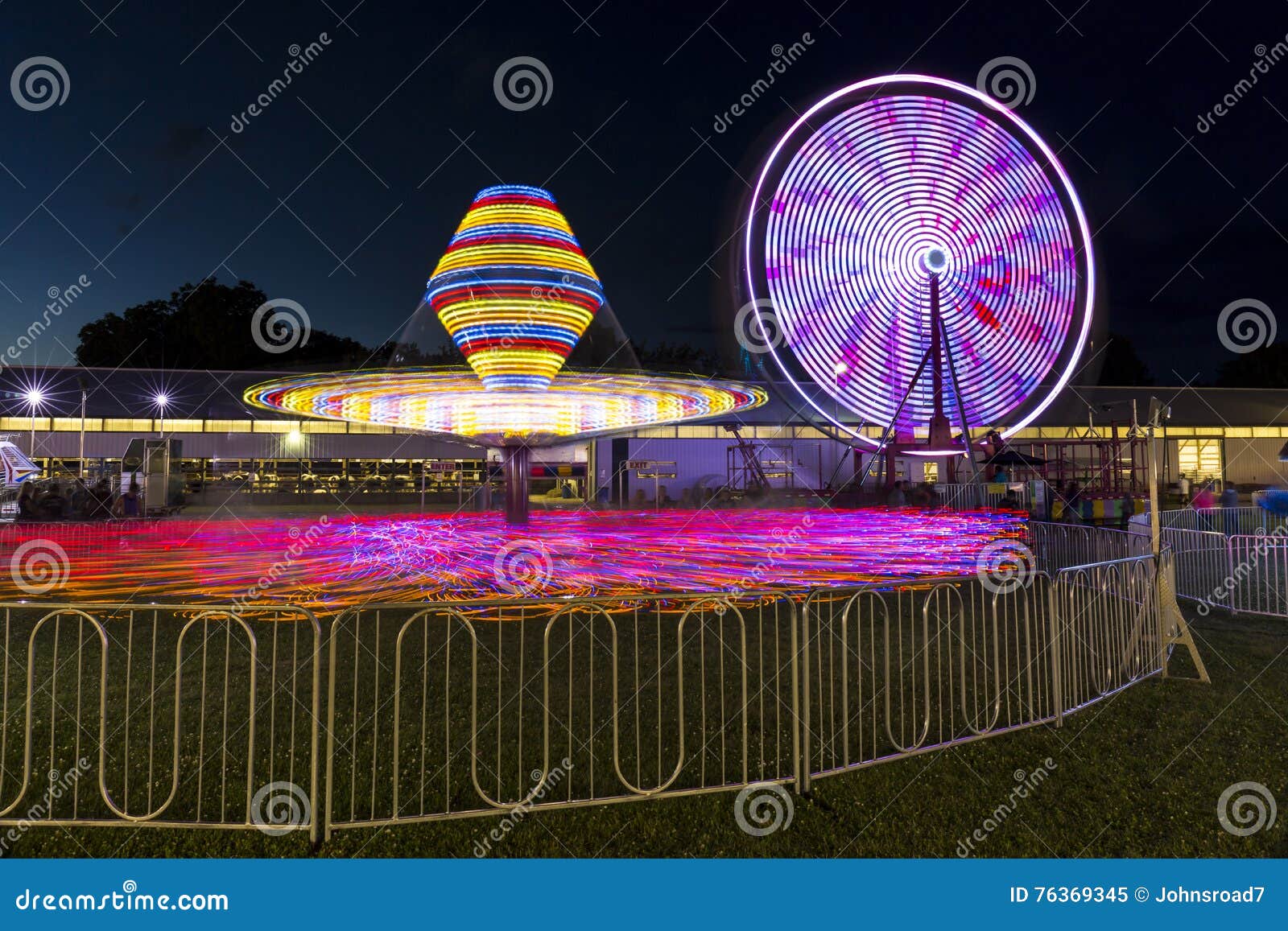 Carnival Rides in Motion stock image. Image of circle - 76369345