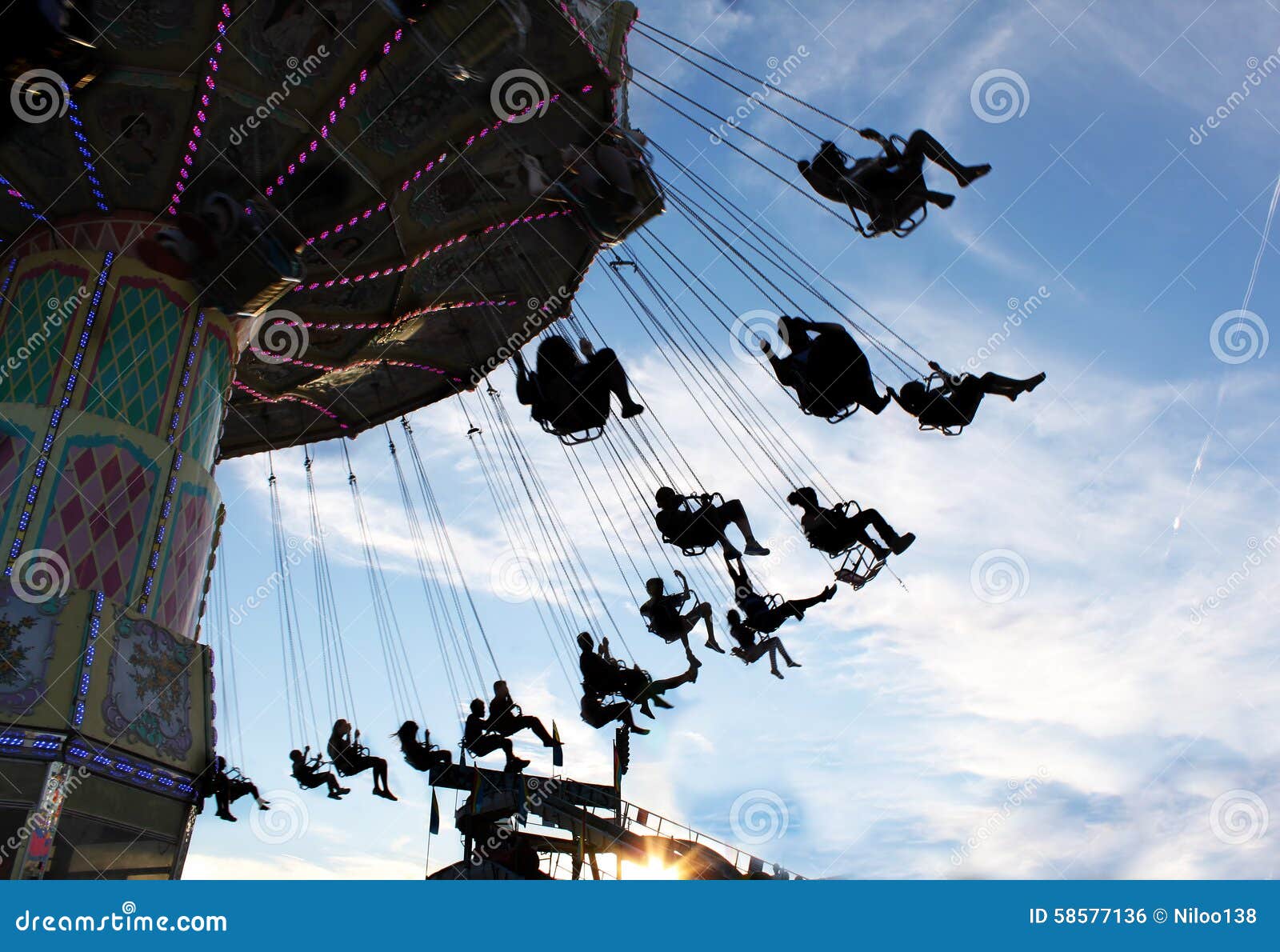 Carnival swing ride stock photo. Image of background - 58577136