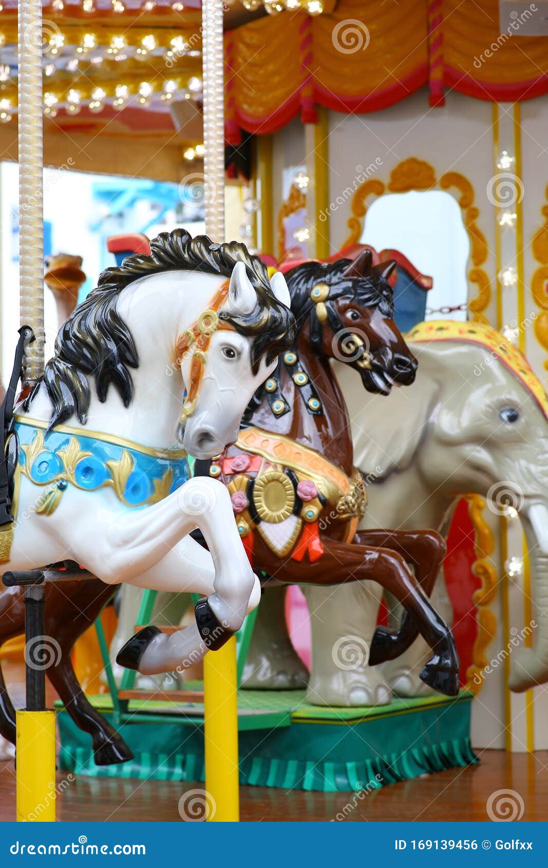 Horses On A Carnival Merry Go Round. Old French Carousel In A Holiday ...