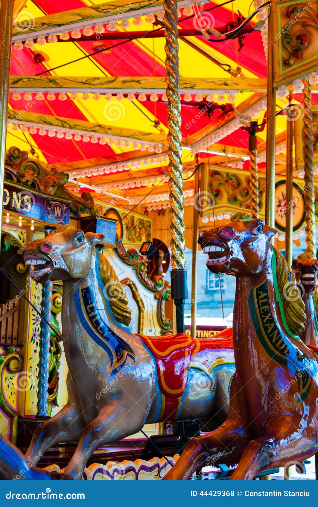 Horses On A Carnival Merry Go Round. Old French Carousel In A Holiday ...