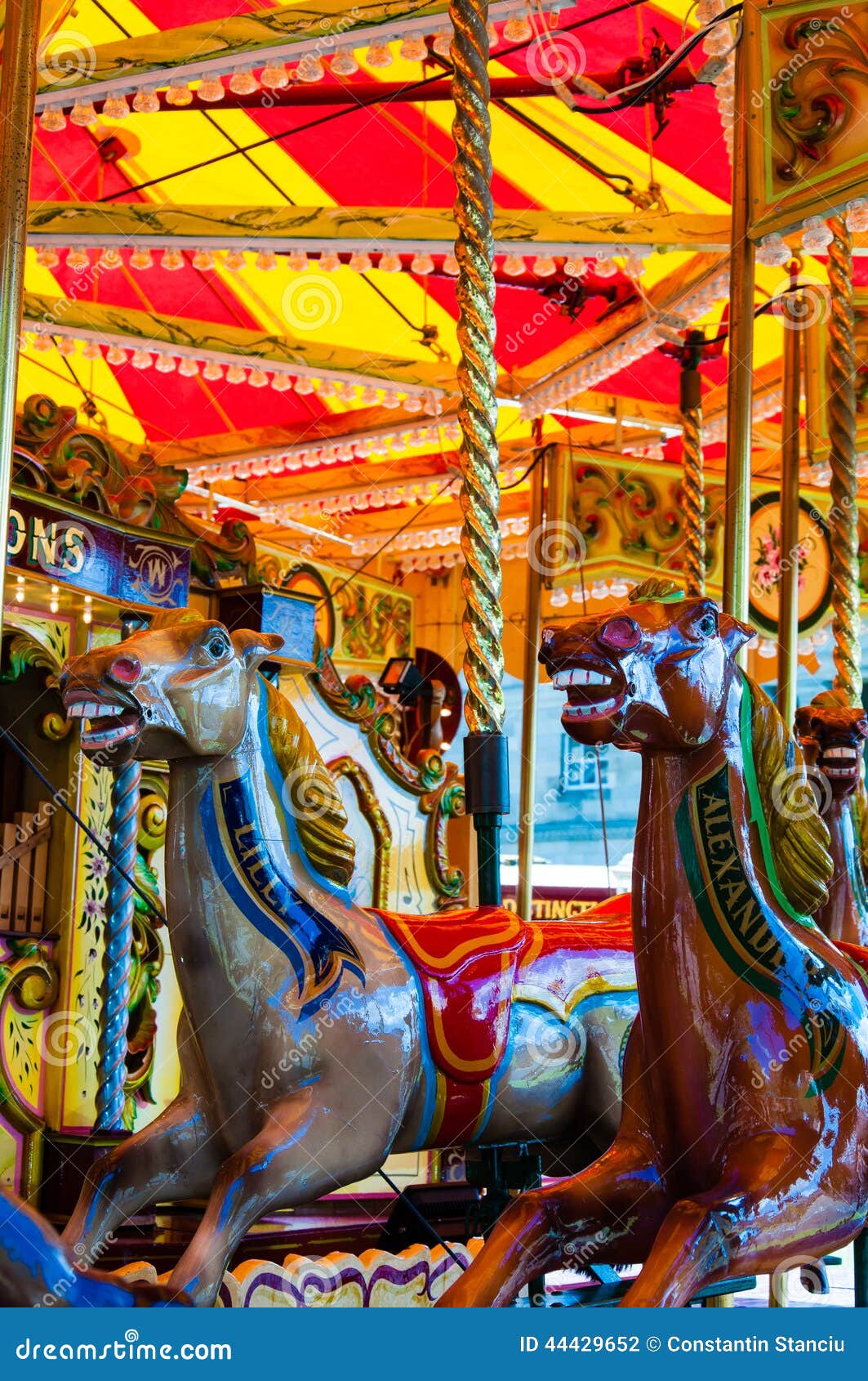 Carousel with Horses on a Carnival Merry Go Round Stock Photo - Image ...
