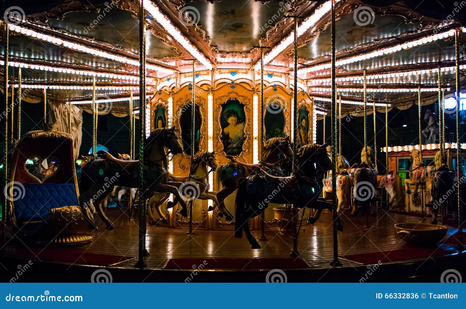 Carousel at night editorial photo. Image of amusement - 66332836