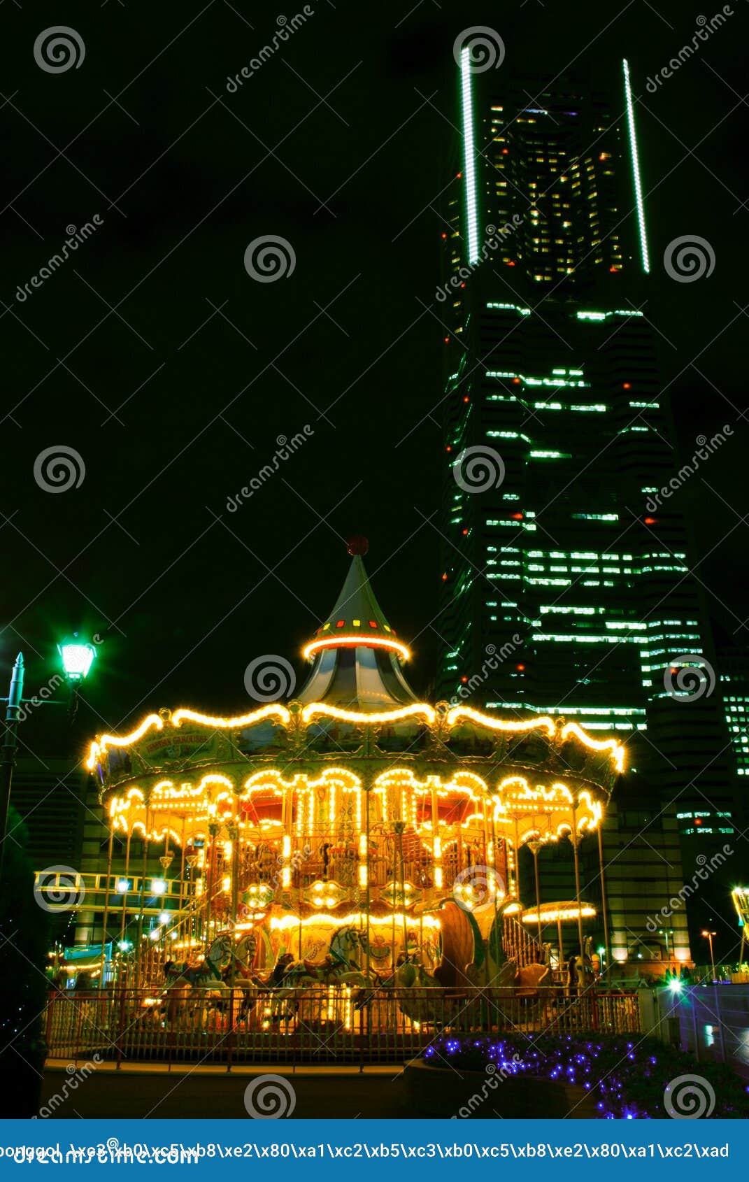 Carousel at night stock photo. Image of amusement, light - 65217256