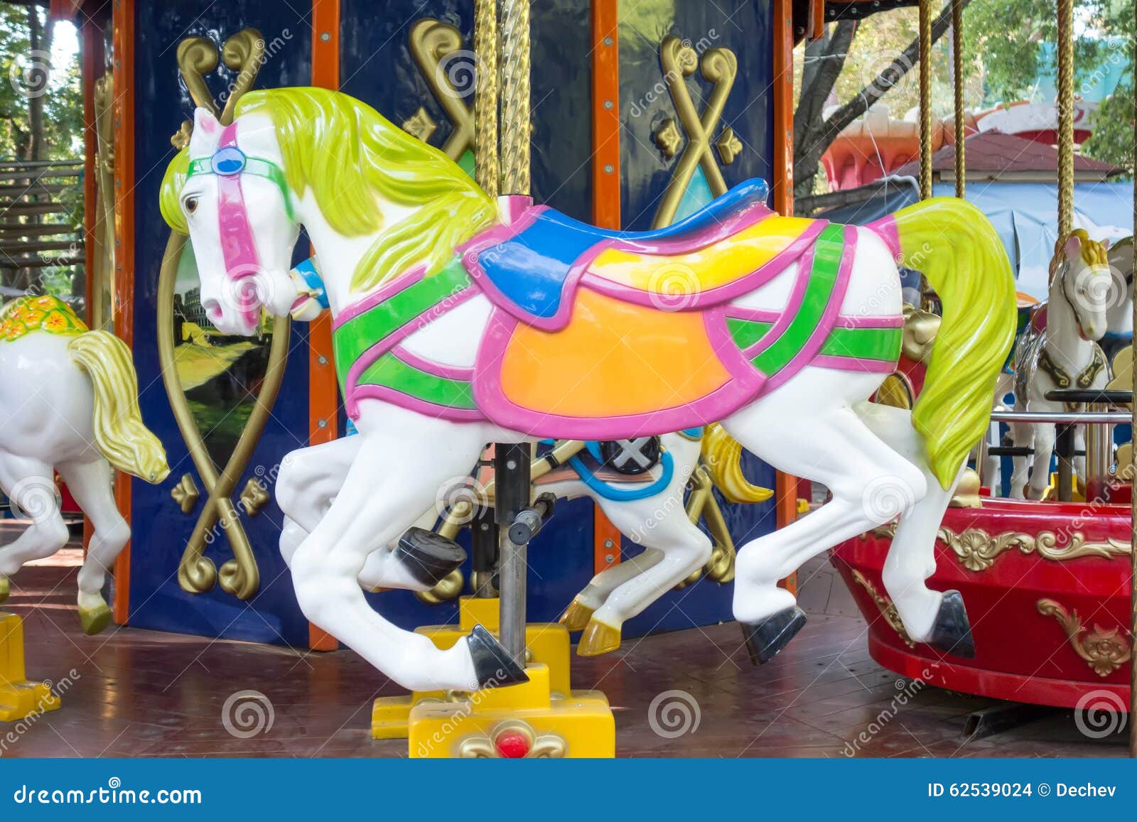 Carousel ride with horses stock photo. Image of colorful - 62539024