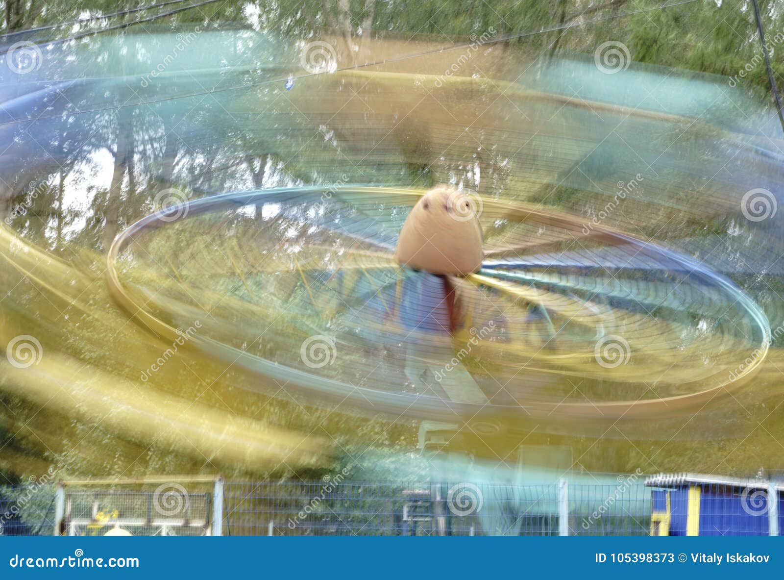 The Carousel is Spinning Fast Stock Image - Image of park, fast: 105398373