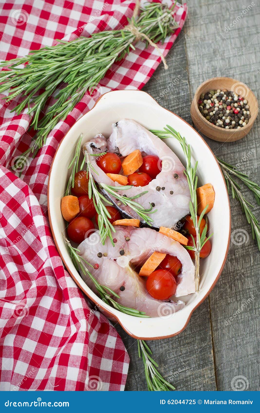 Carp Steak with Rosemary and Pepper in a Ceramic Form Stock Image ...