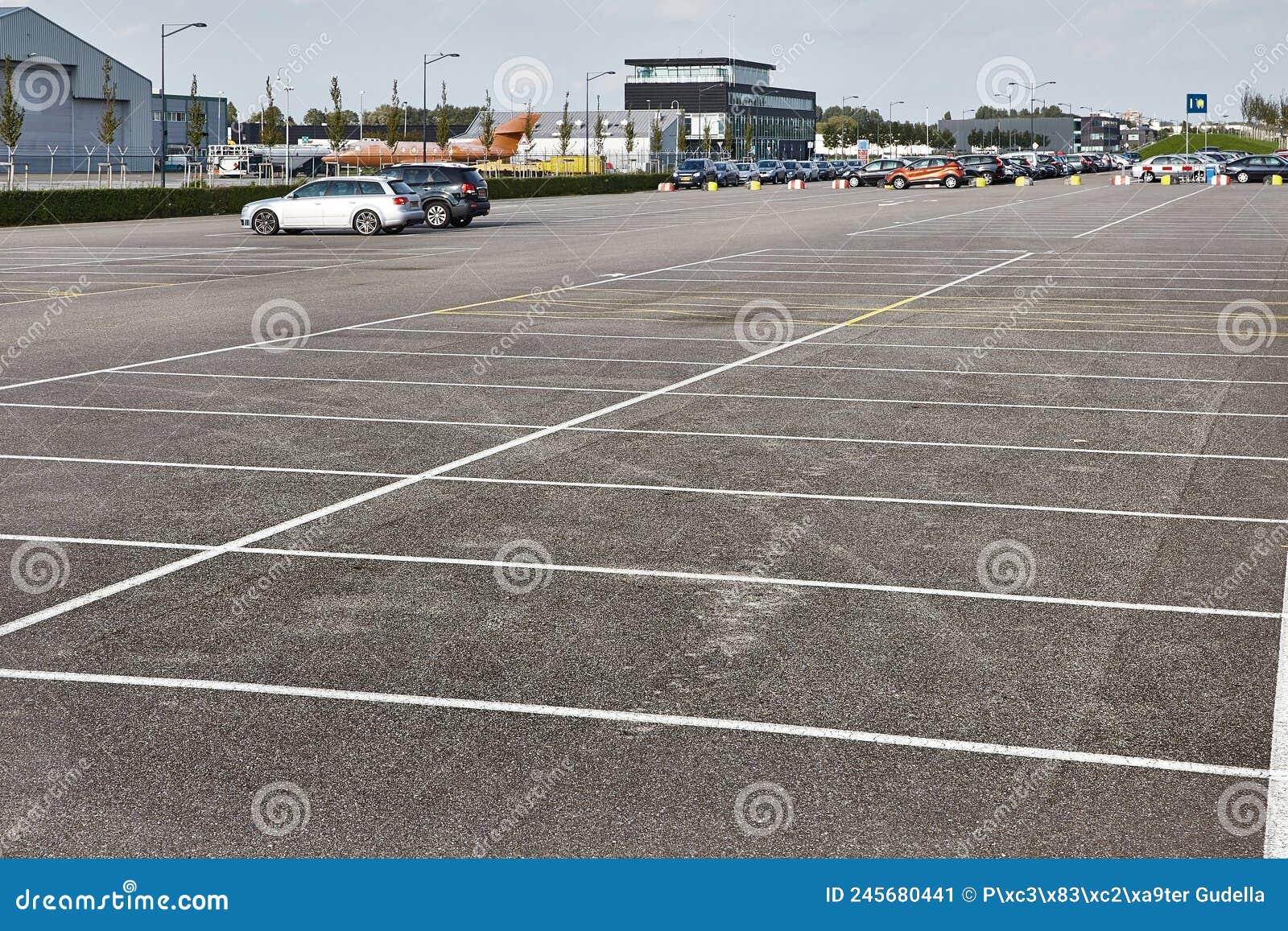 Carpark with empty spots stock image. Image of urban - 245680441