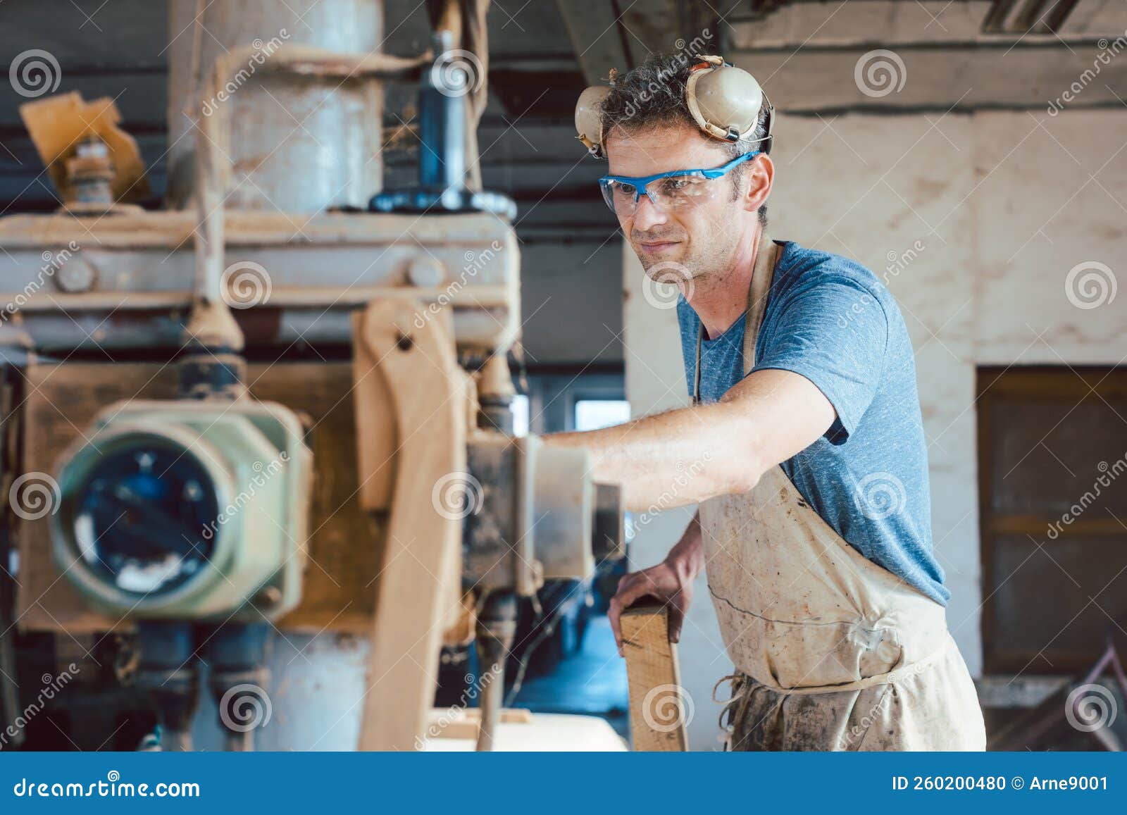 Carpenter Adjusting the Machine Planer Stock Photo - Image of german ...