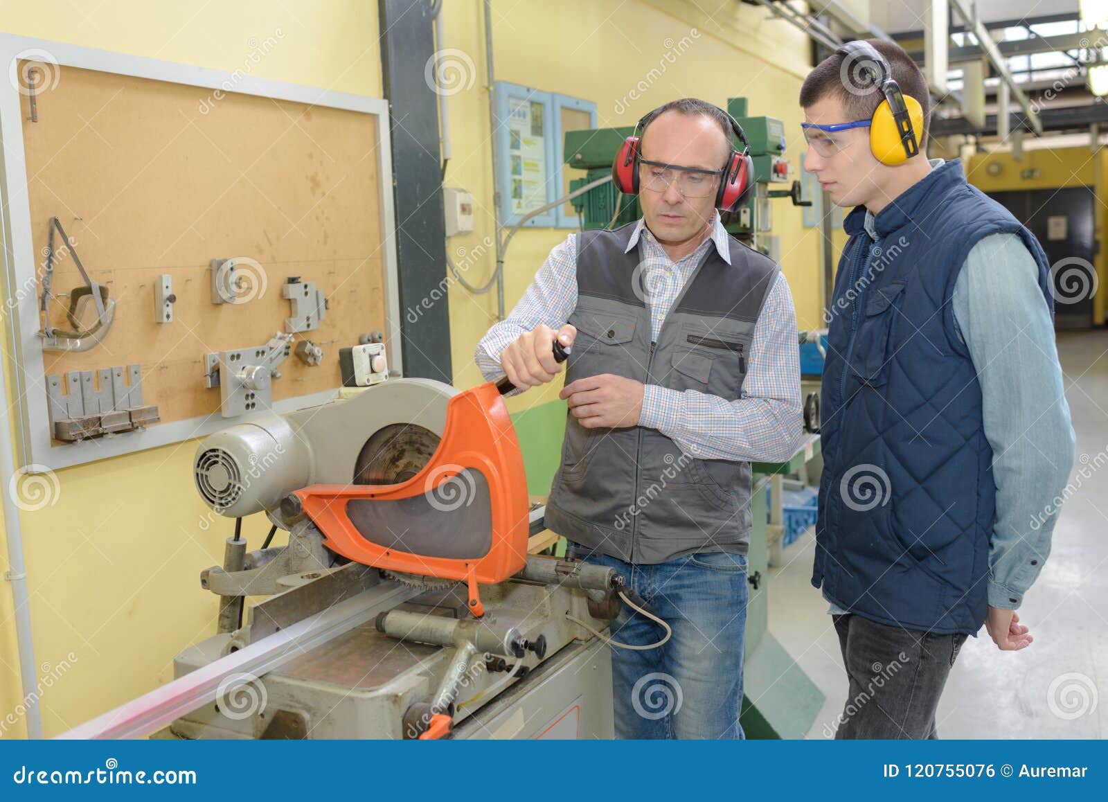 Carpenter and Apprentice Using Circular Saw Stock Photo - Image of ...