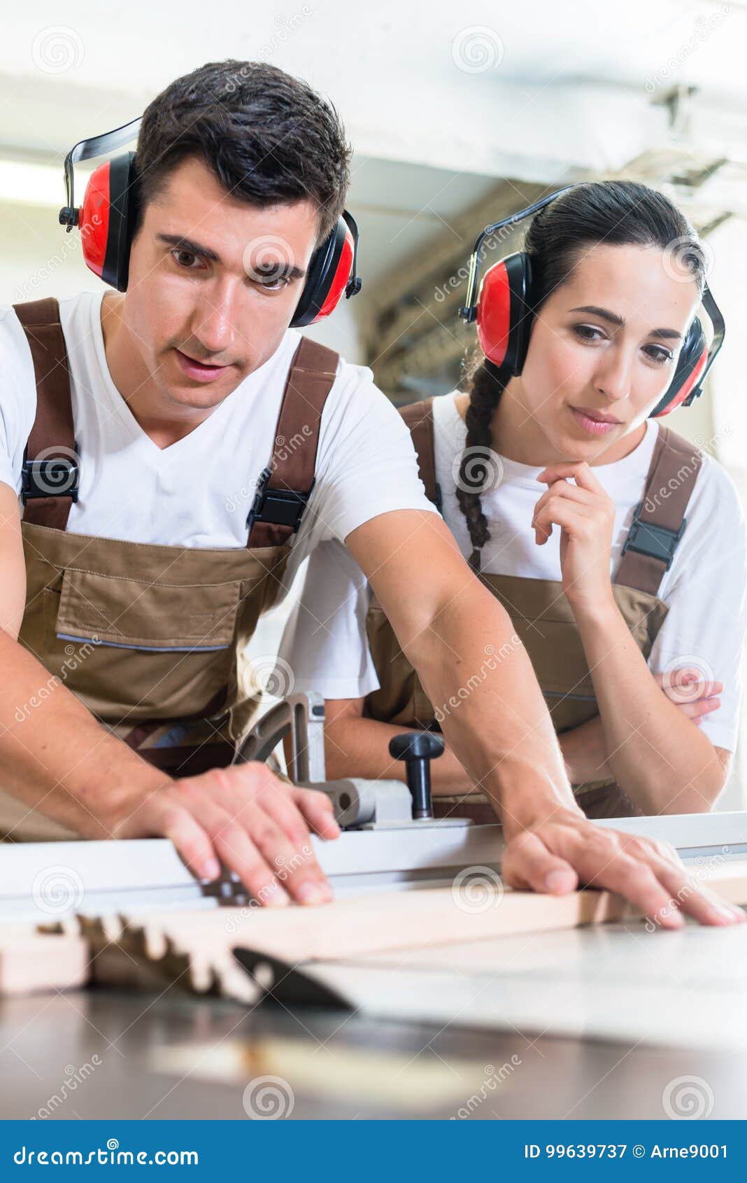 Carpenter and Apprentice Working Together in Workshop Stock Image ...