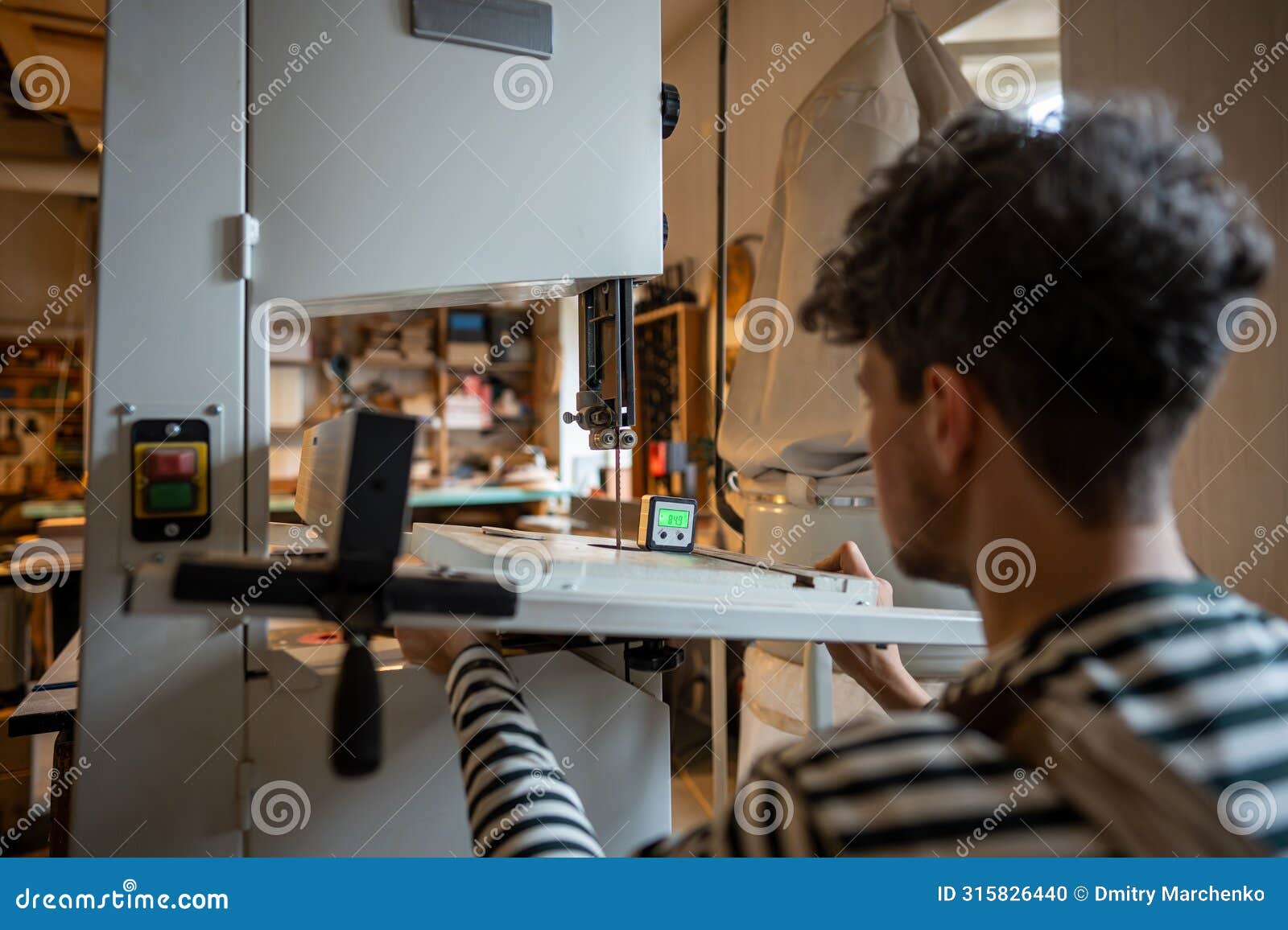 Carpenter Calibrates Lathe for Work. Man Joiner Setting Right Level ...