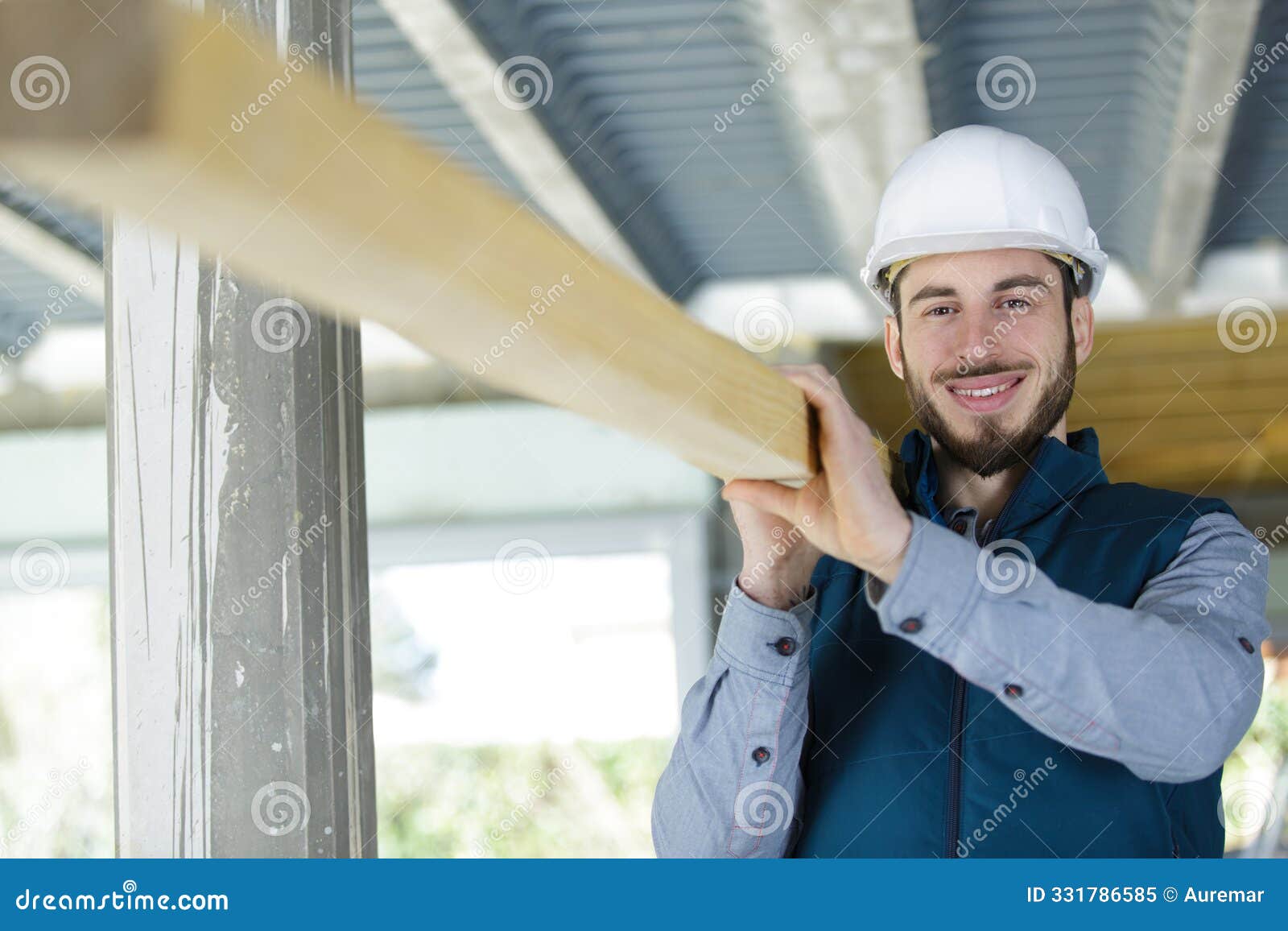 Carpenter Carrying Timber Plank at Construction Site Stock Image ...