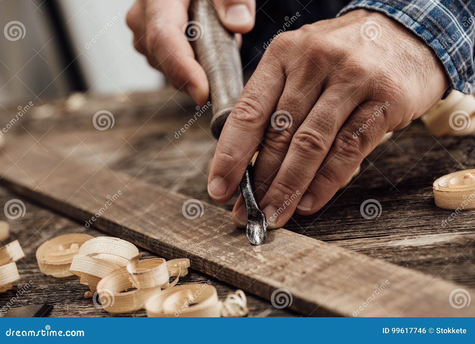 Carpenter carving wood stock photo. Image of hands, lumber - 99617746
