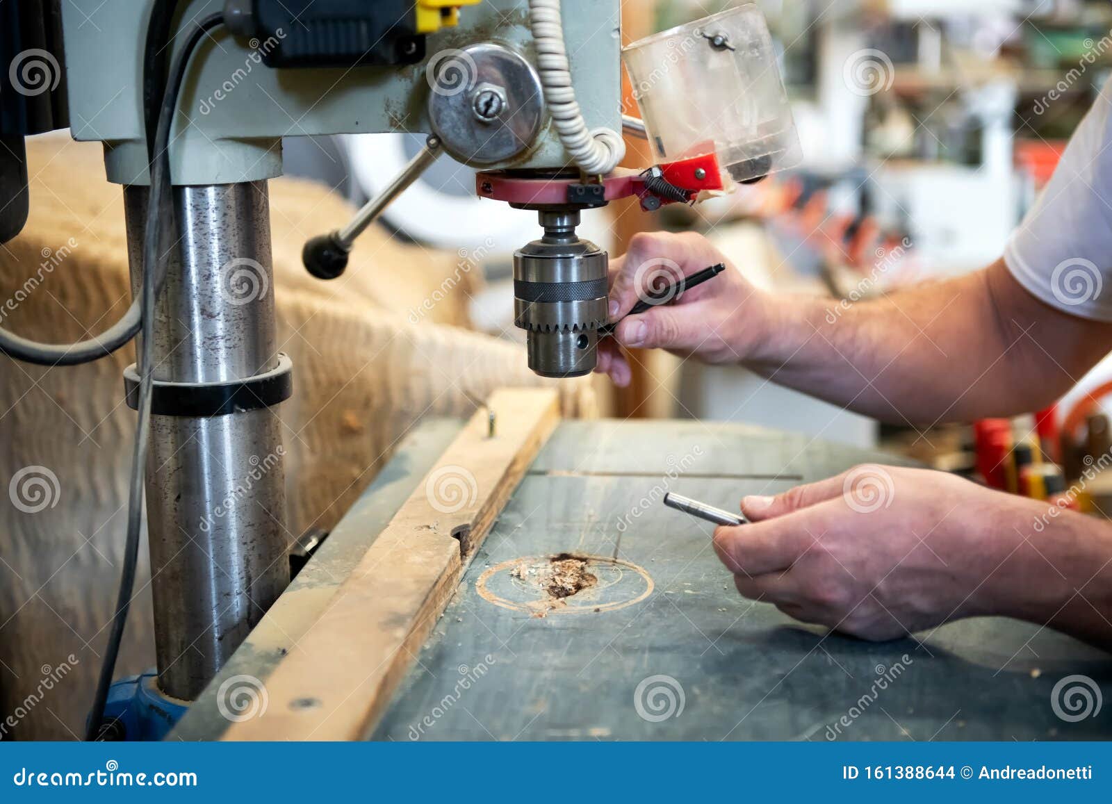 Carpenter Changing the Bit on a Vertical Drill Stock Photo - Image of ...