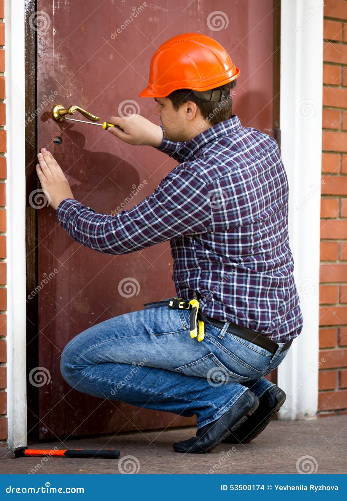 Carpenter Changing Lock in Heavy Metal Door Stock Photo - Image of ...
