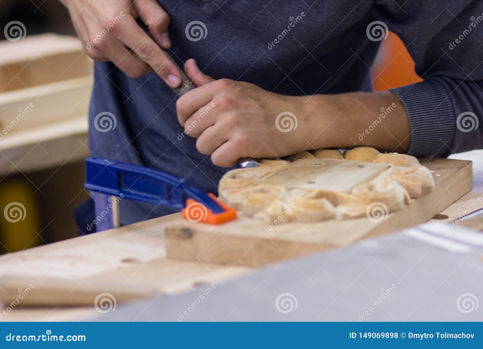 Carpenter with a Chisel in His Hands on the Workbench Stock Photo ...